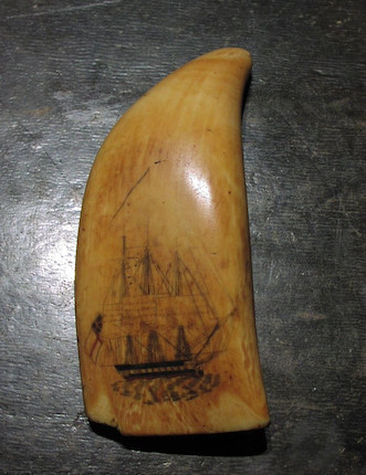 Bonhams : A 19th century decorated whale's tooth, 6.8in(17cm)long.