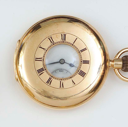 Bonhams : A 9ct gold half hunter pocket watch and Albert chain
