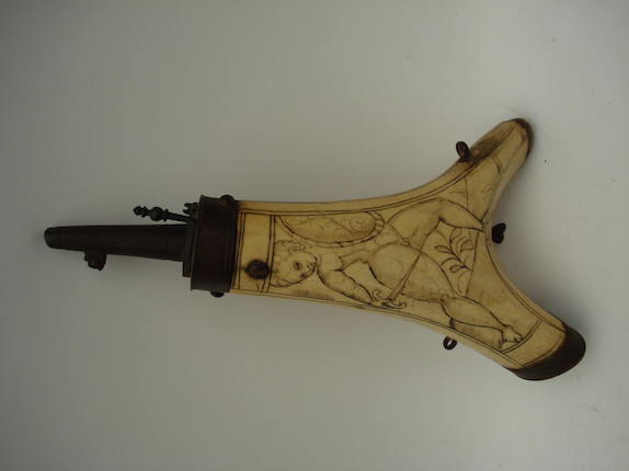Bonhams : A 17th century German bone and steel powder flask