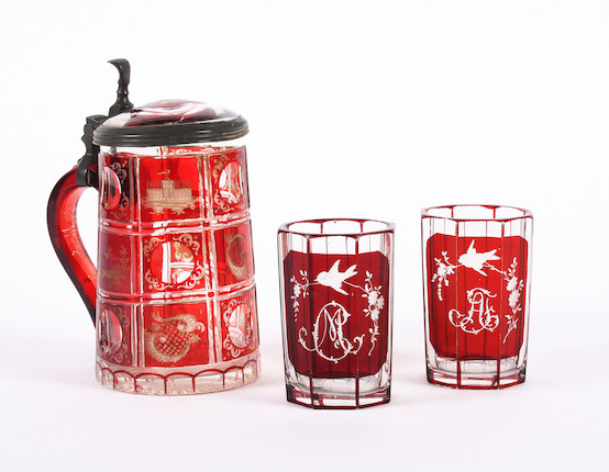 Bonhams A Bohemian Engraved Ruby Flashed Tankard And Two Beakers