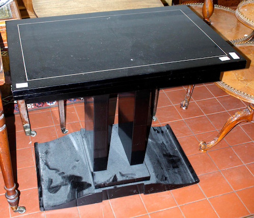 Bonhams : An ebonised rectangular games table, with foldover top, on ...