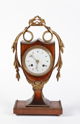 Bonhams : An Austrian gilt-metal mounted, shield-shape mantel clock