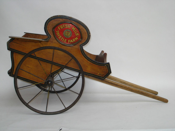 Bonhams : Painted wooden milk cart from the Pollocks museum, London,