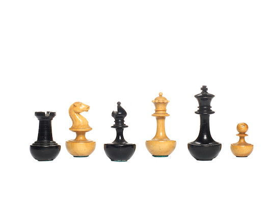 Bonhams : A boxwood and ebonised ship's travelling chess set, circa 1880,