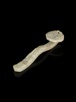 Bonhams : A rare pale green jade ruyi sceptre 17th century