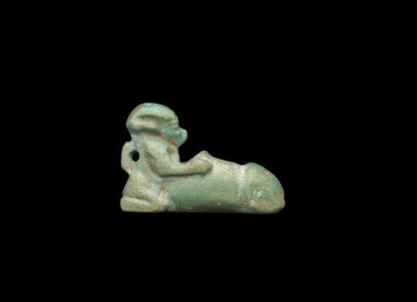 Bonhams : An Egyptian green glazed composition Ithyphallic amulet