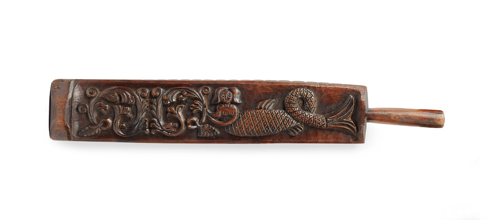 Bonhams : Folk Art An 18th/19th century carved beech washing bat