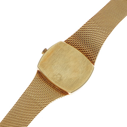 Bonhams : Tusal. A 14K gold manual wind bracelet watch Circa 1960