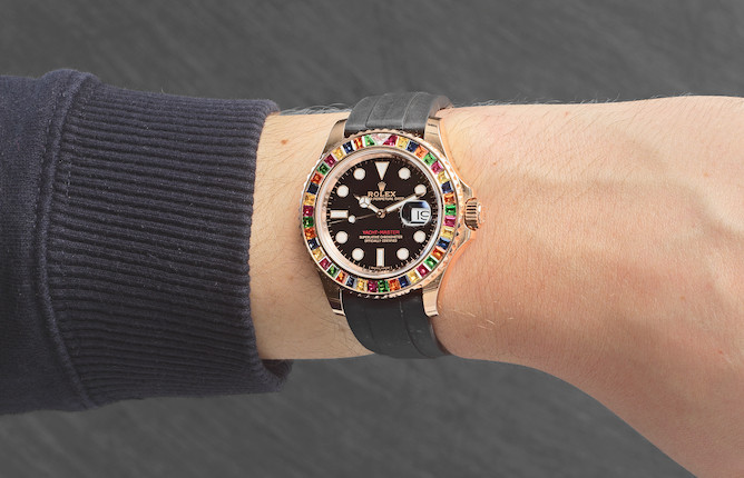 Bonhams : Rolex. A fine and rare 18K rose gold sapphire, tsavorite and ...