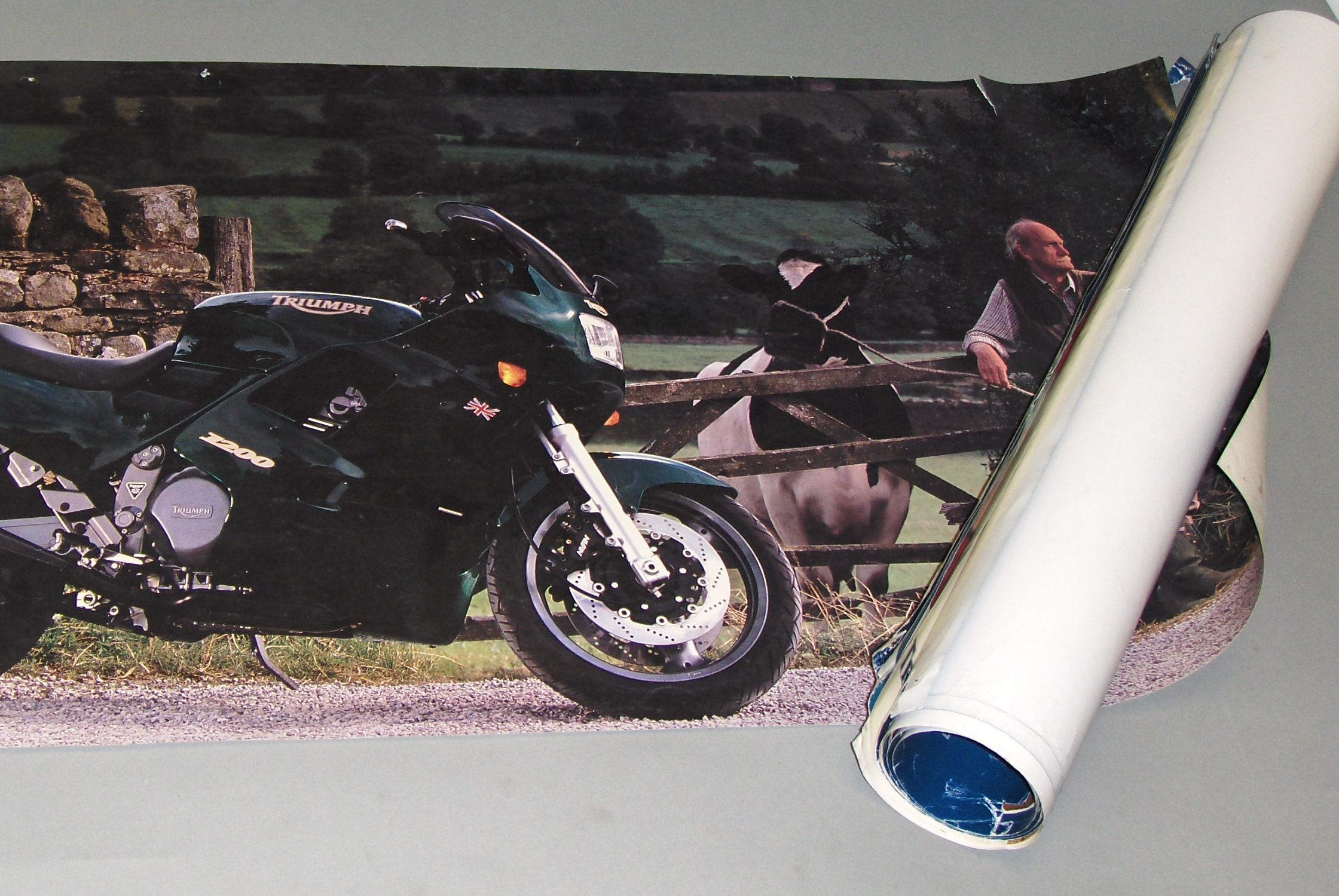 Bonhams Cars : Six 1990s Triumph showroom posters.