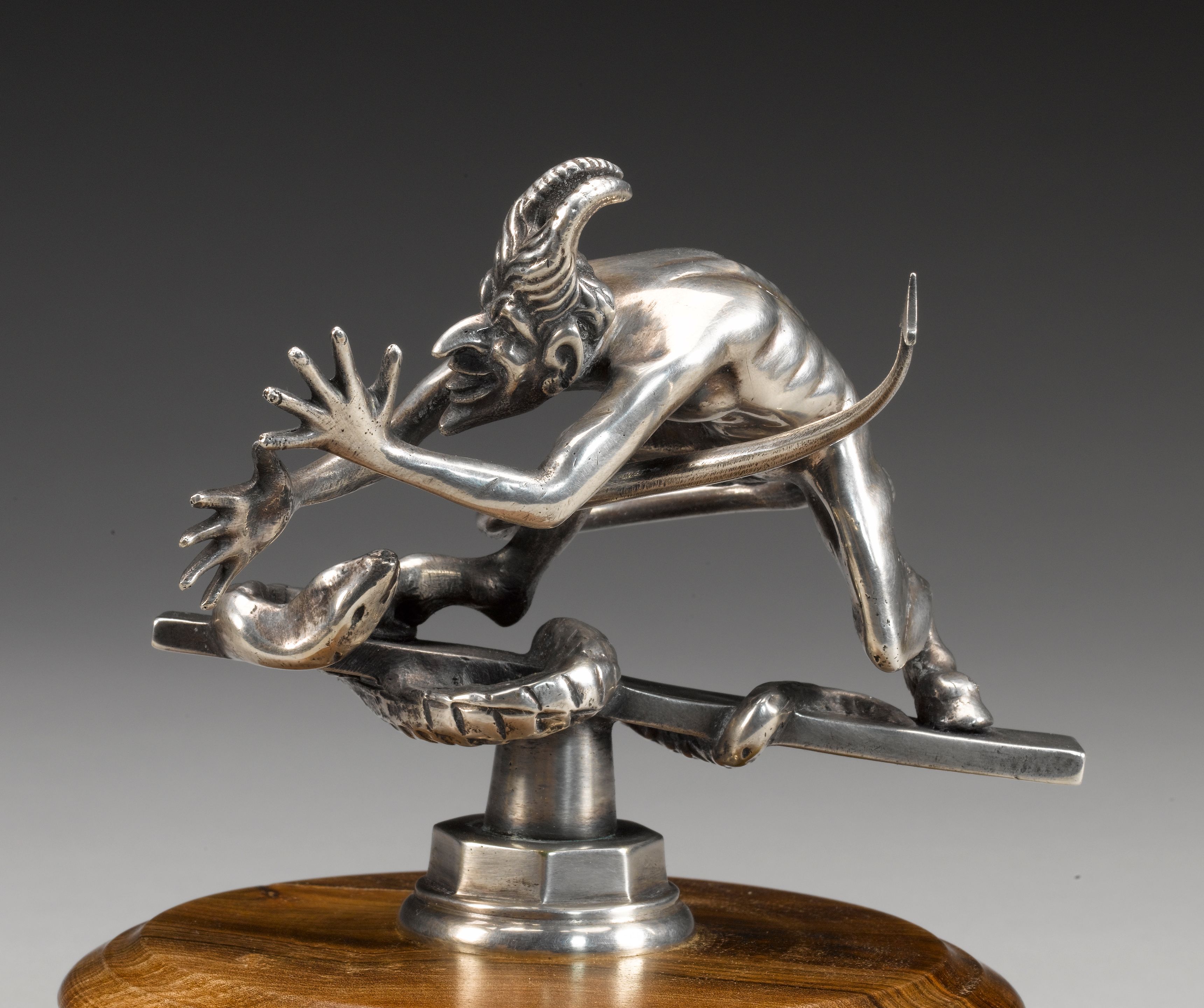 Bonhams Cars : A 'Rude Devil' mascot by Stadium for Dunhill's, British ...