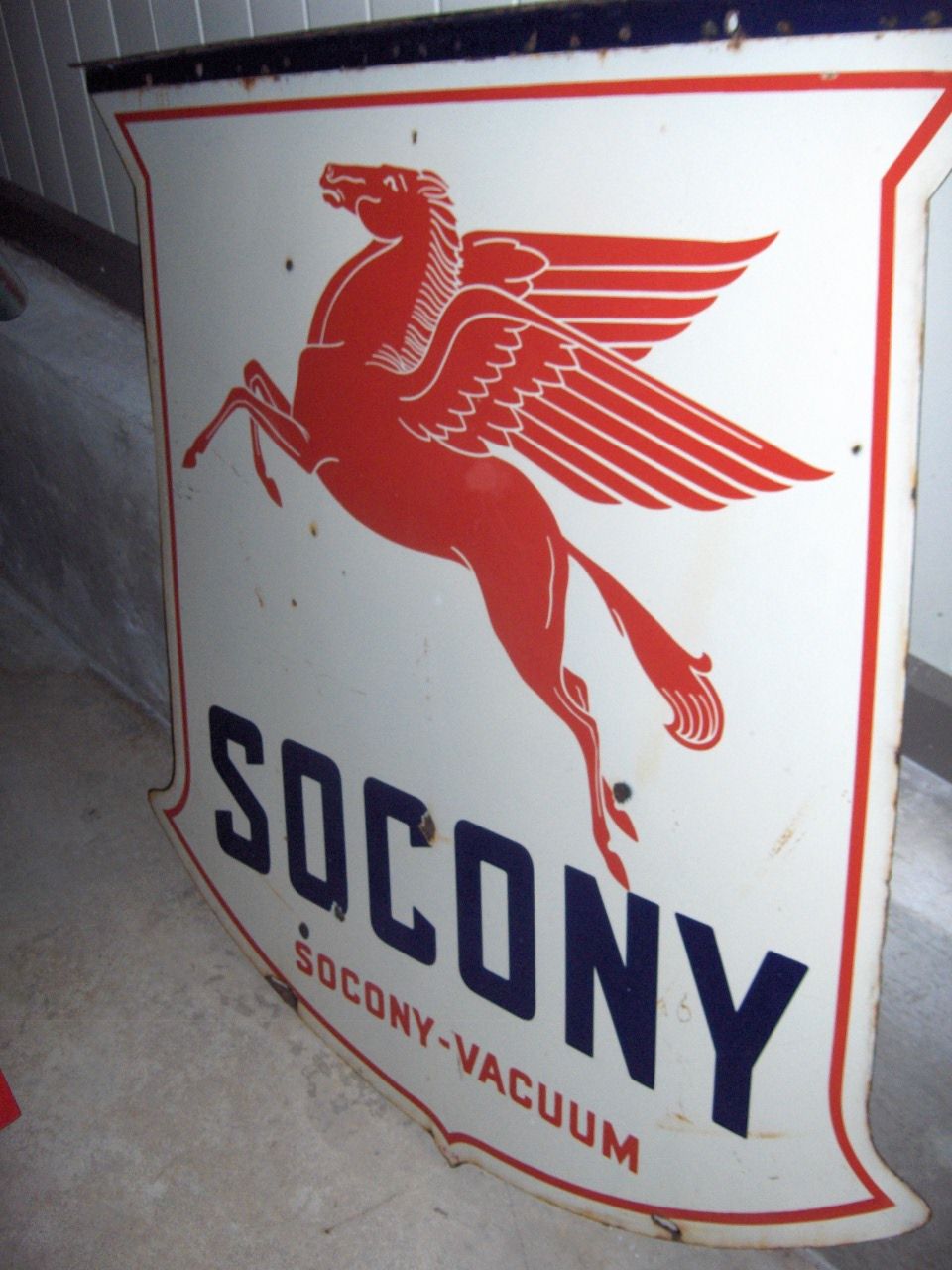 Bonhams Cars : A large Socony enamel sign,,