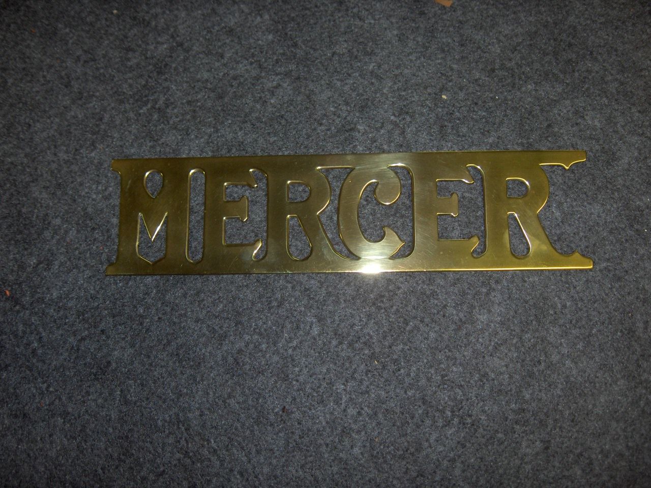 Bonhams Cars : A Mercer brass script,,