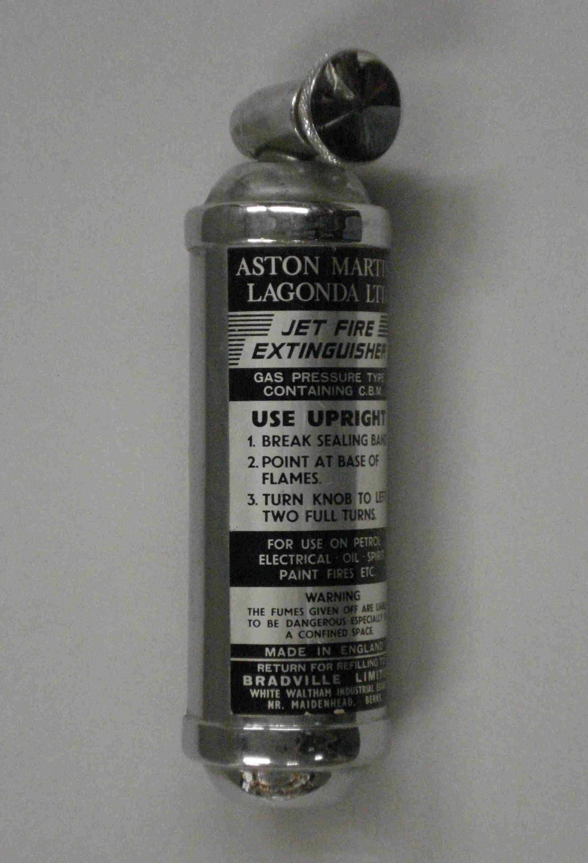 Bonhams Cars : An Aston Martin DB4/DB5 fire extinguisher,