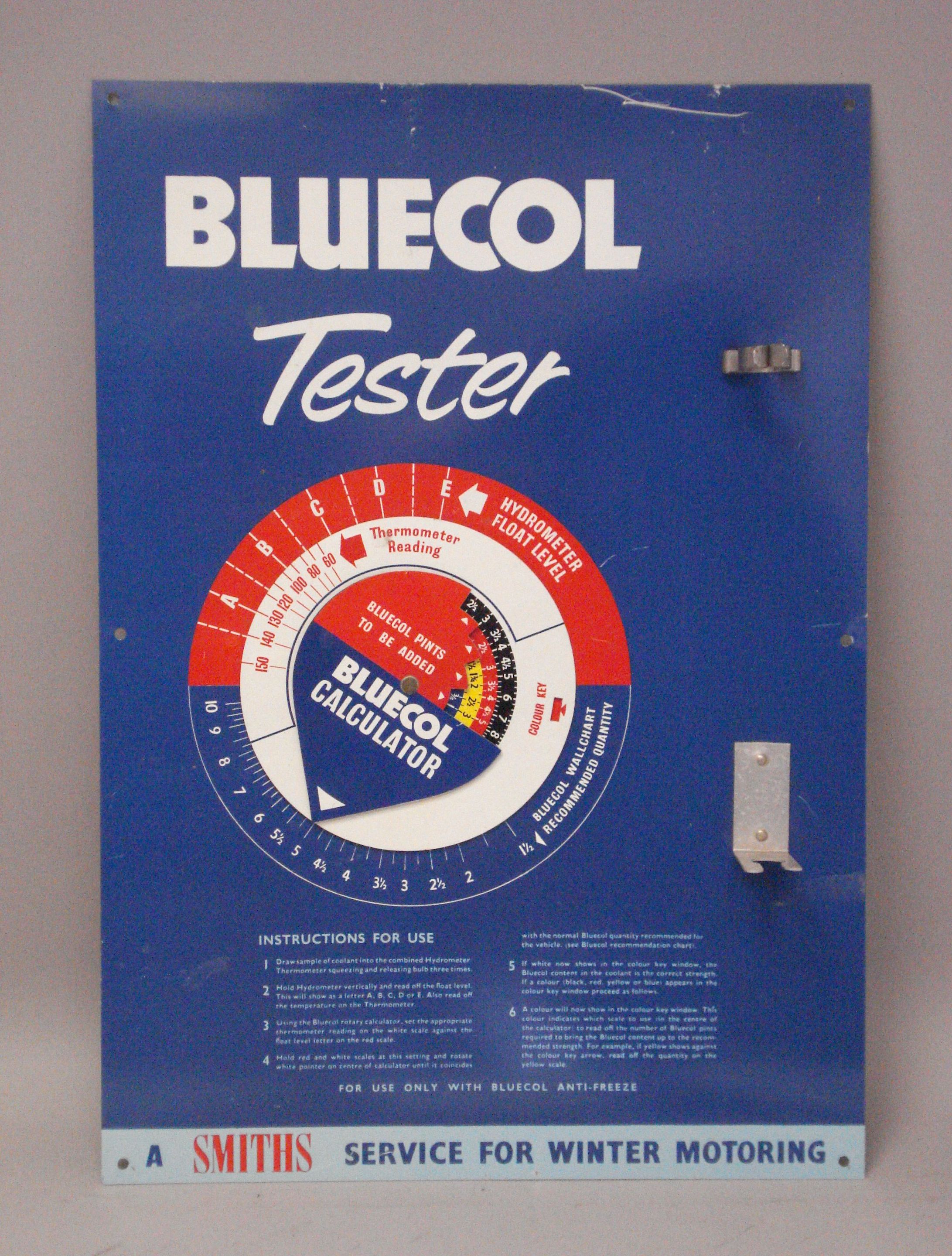 Bonhams Cars : An advertising sign for Bluecol Anti-freeze,