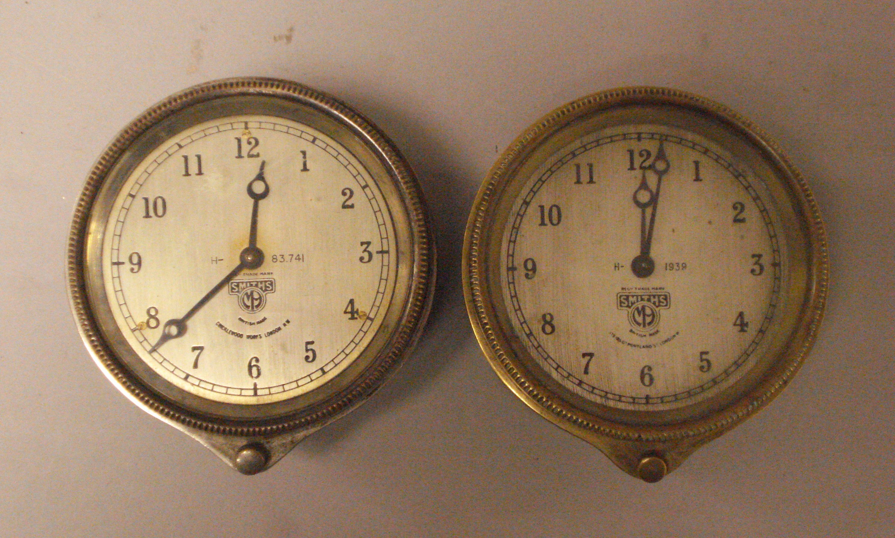Bonhams Cars : Two vintage Smiths bezel-wind clocks,