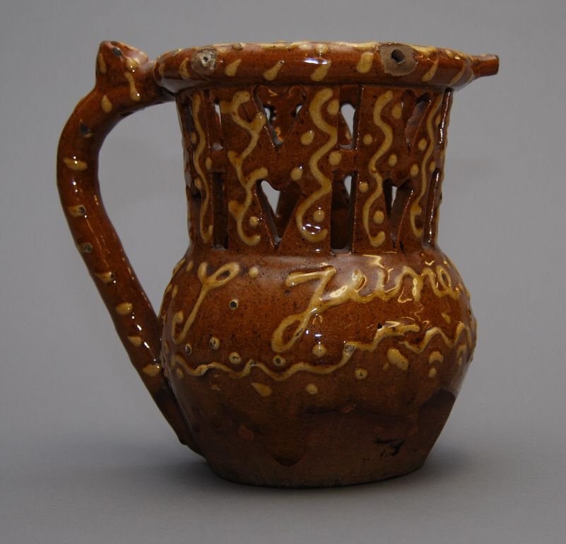 Bonhams : A slipware puzzle jug dated 1843