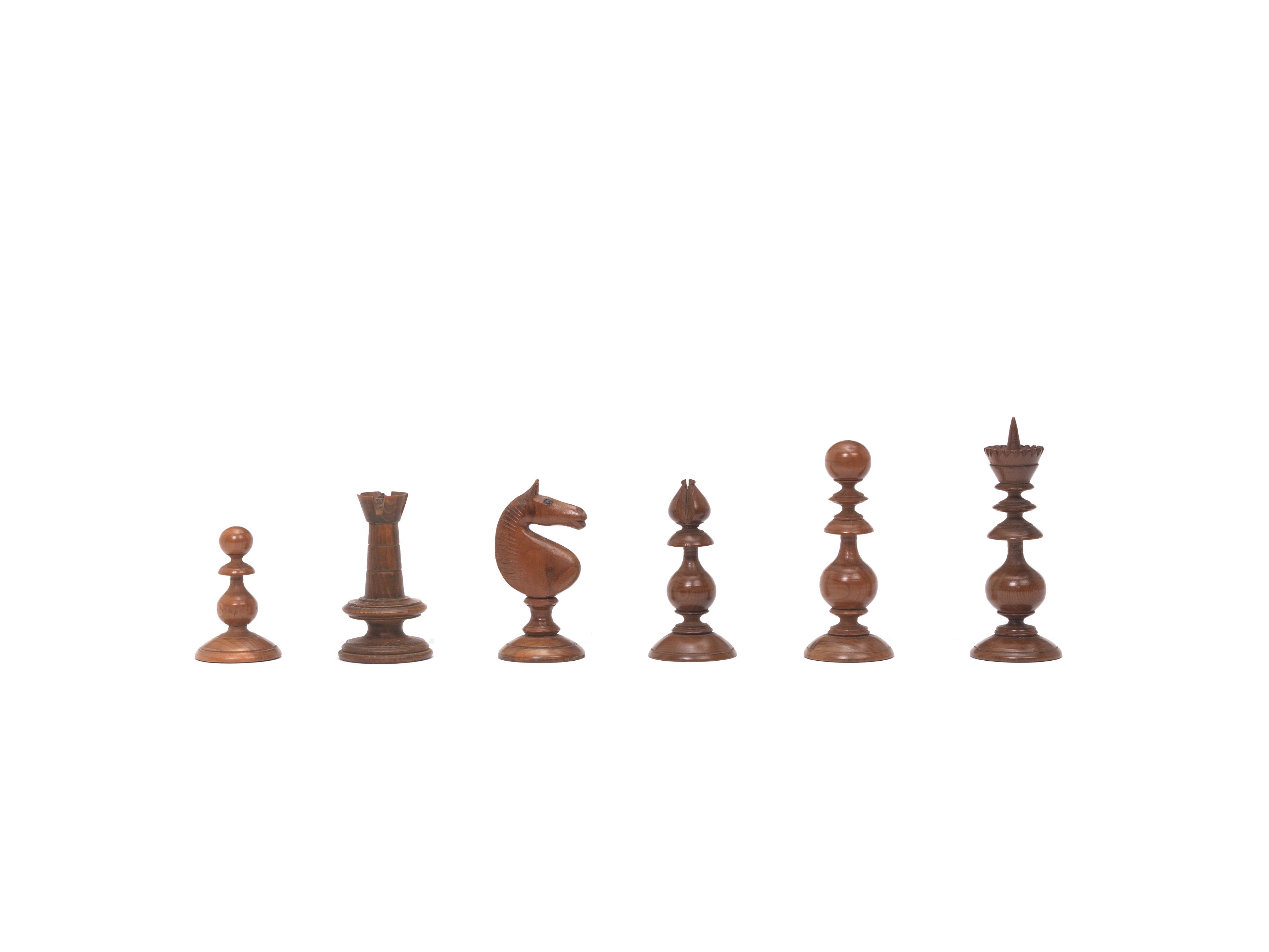 Bonhams : An arbutus wood chess set, Killarney, Ireland, circa 1880,