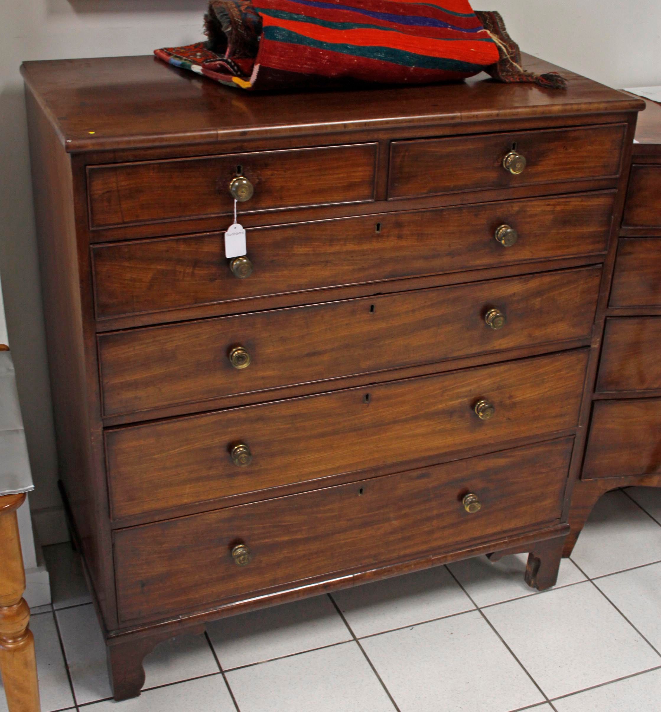 Bonhams : A late Georgian mahogany chest,of two short and four long ...