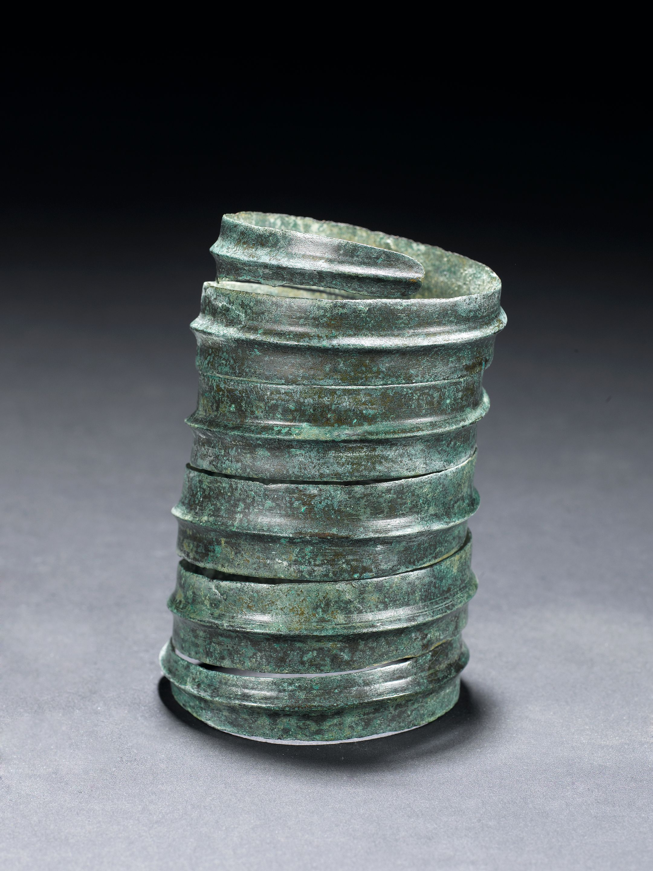 Bonhams : A bronze spiral armlet