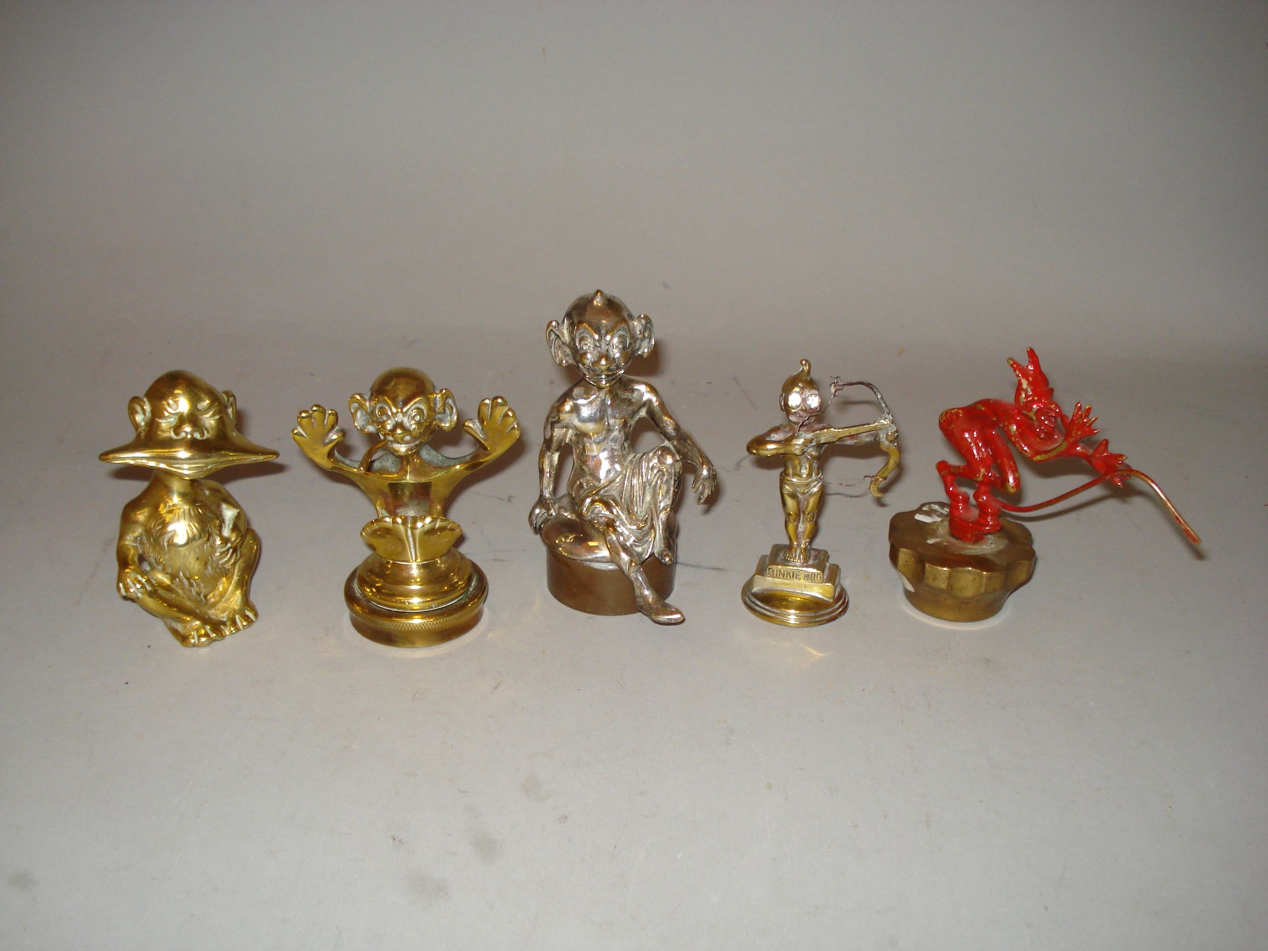 Bonhams Cars : Five small character mascots,