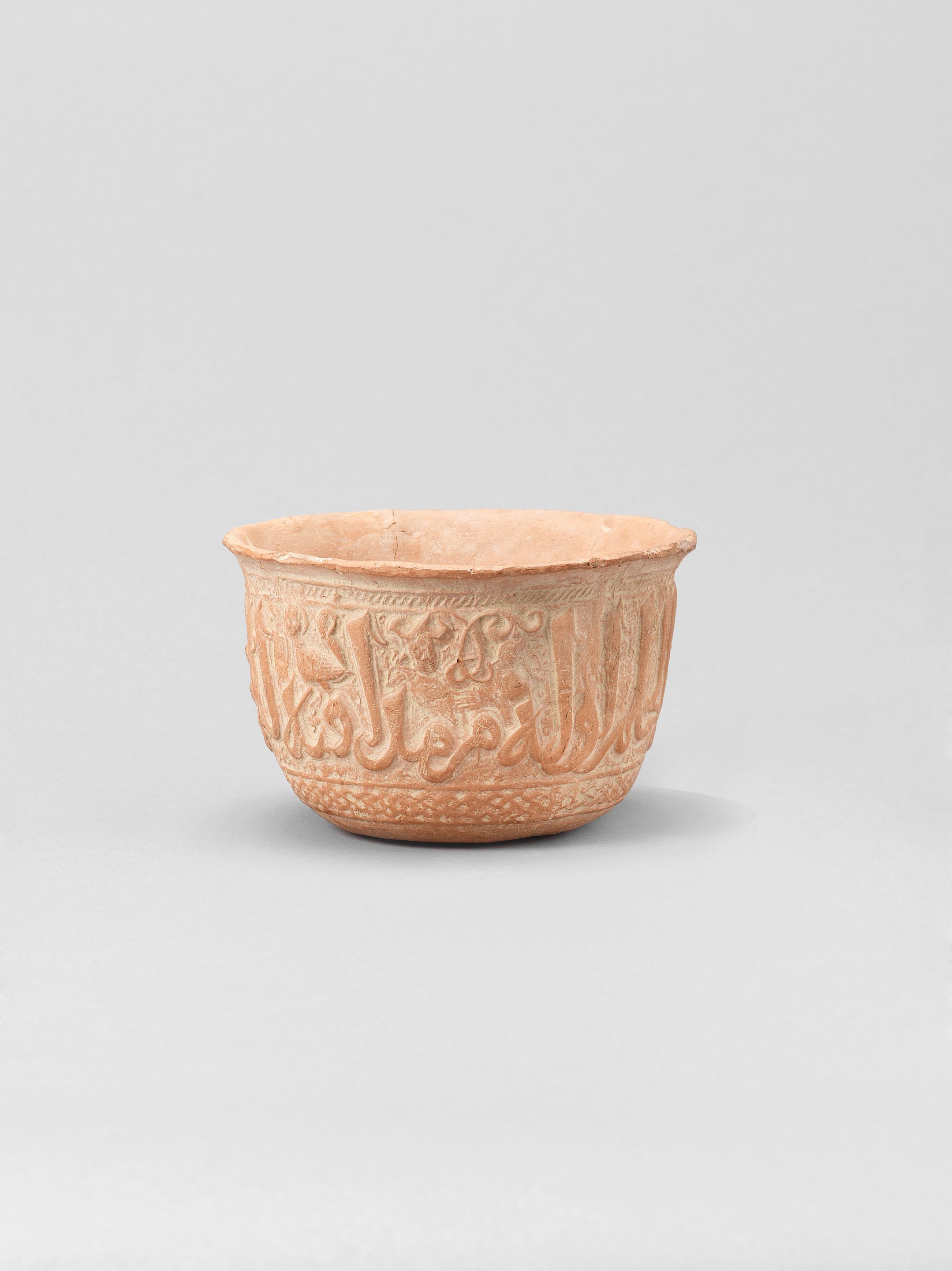Bonhams : A Seljuk unglazed earthernware pottery Mould signed by 'Abd ...