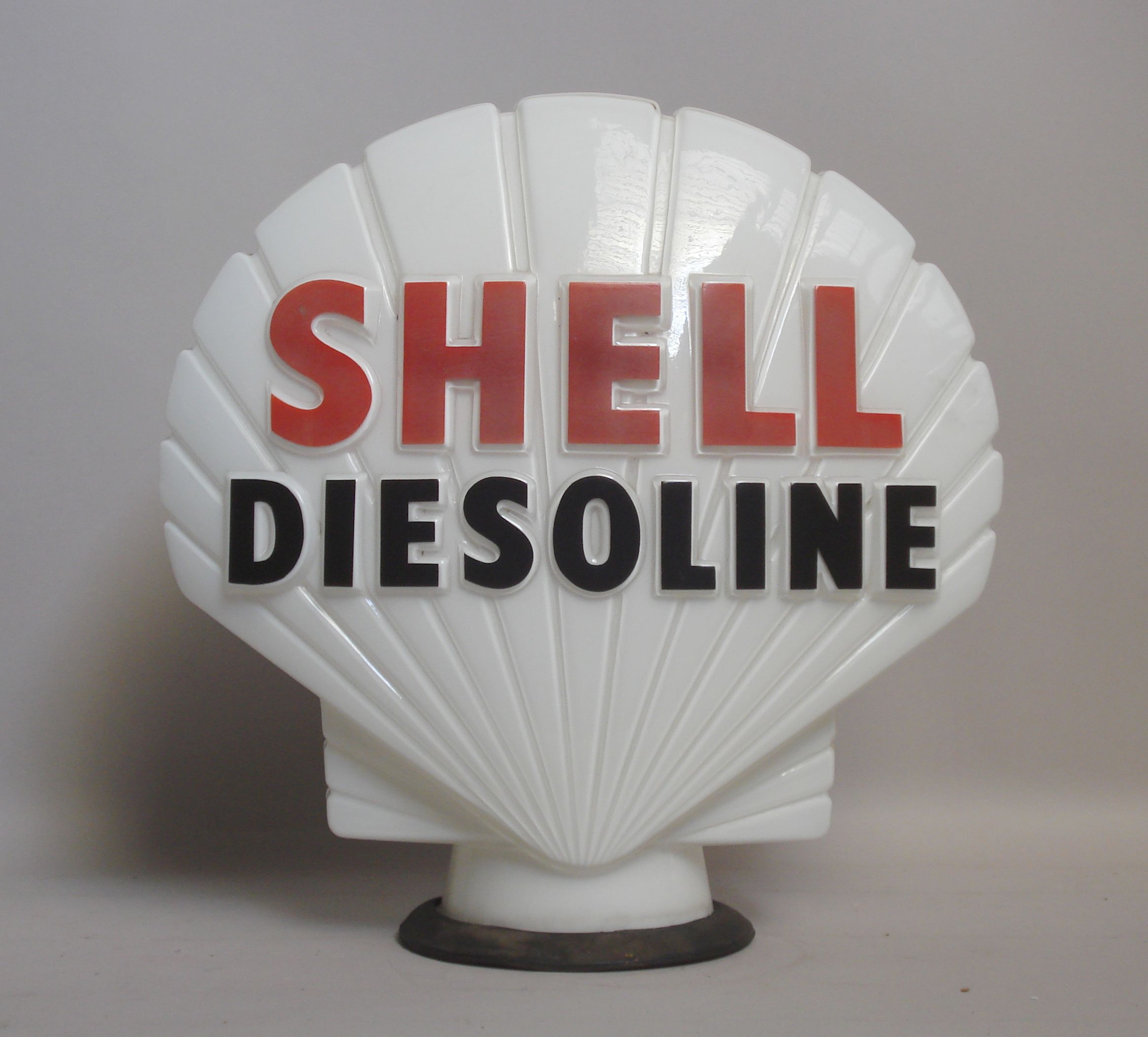 Bonhams Cars : A Shell Diesoline shell-shaped glass petrol pump globe,