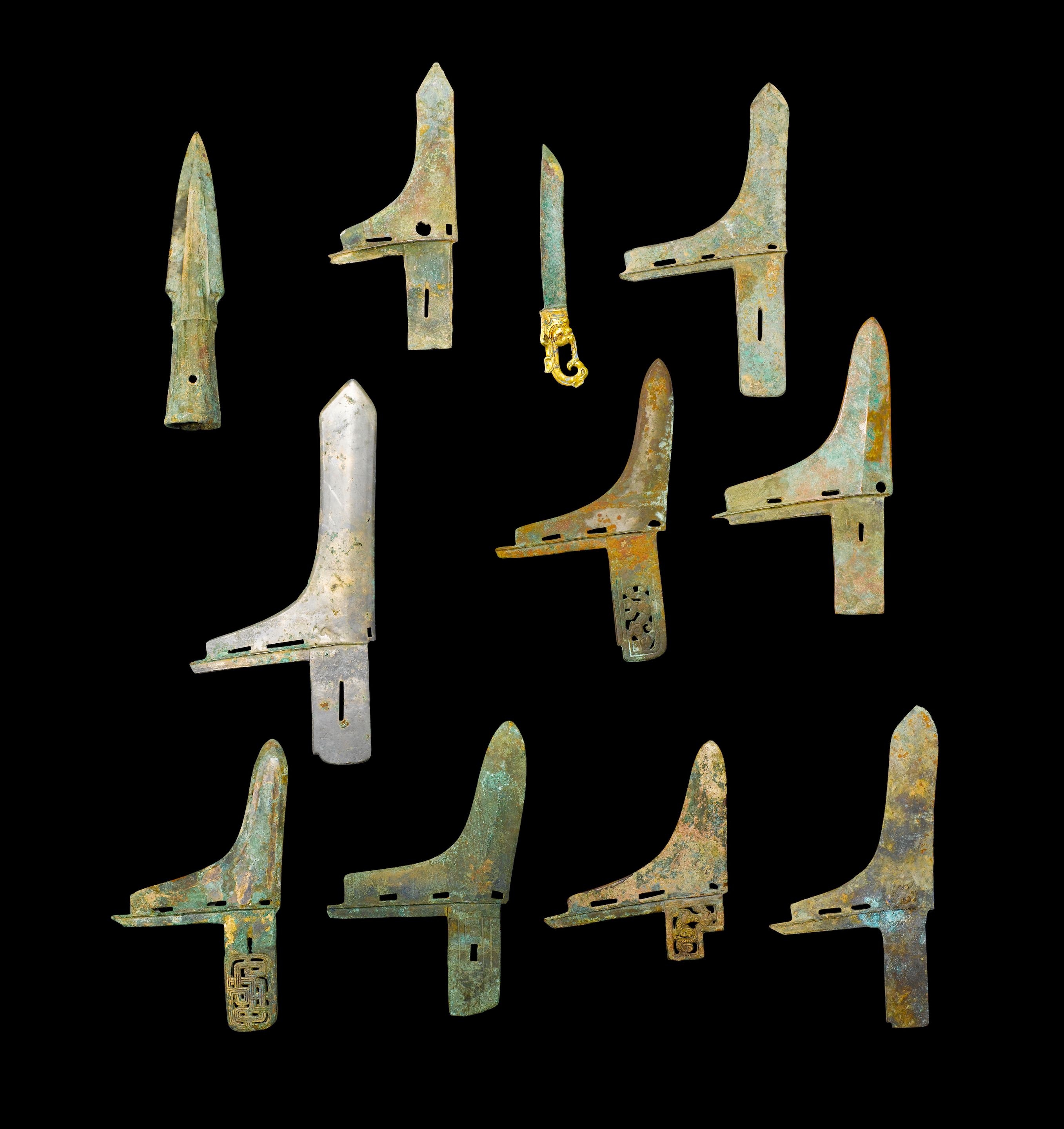 Bonhams : Eleven bronze dagger axes, a spear head and a utility knife ...