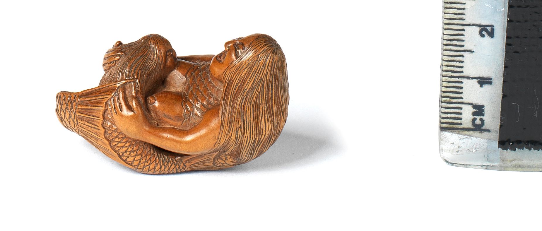 Bonhams : A wood netsuke of a ningyo (mermaid) and child By Tanaka ...