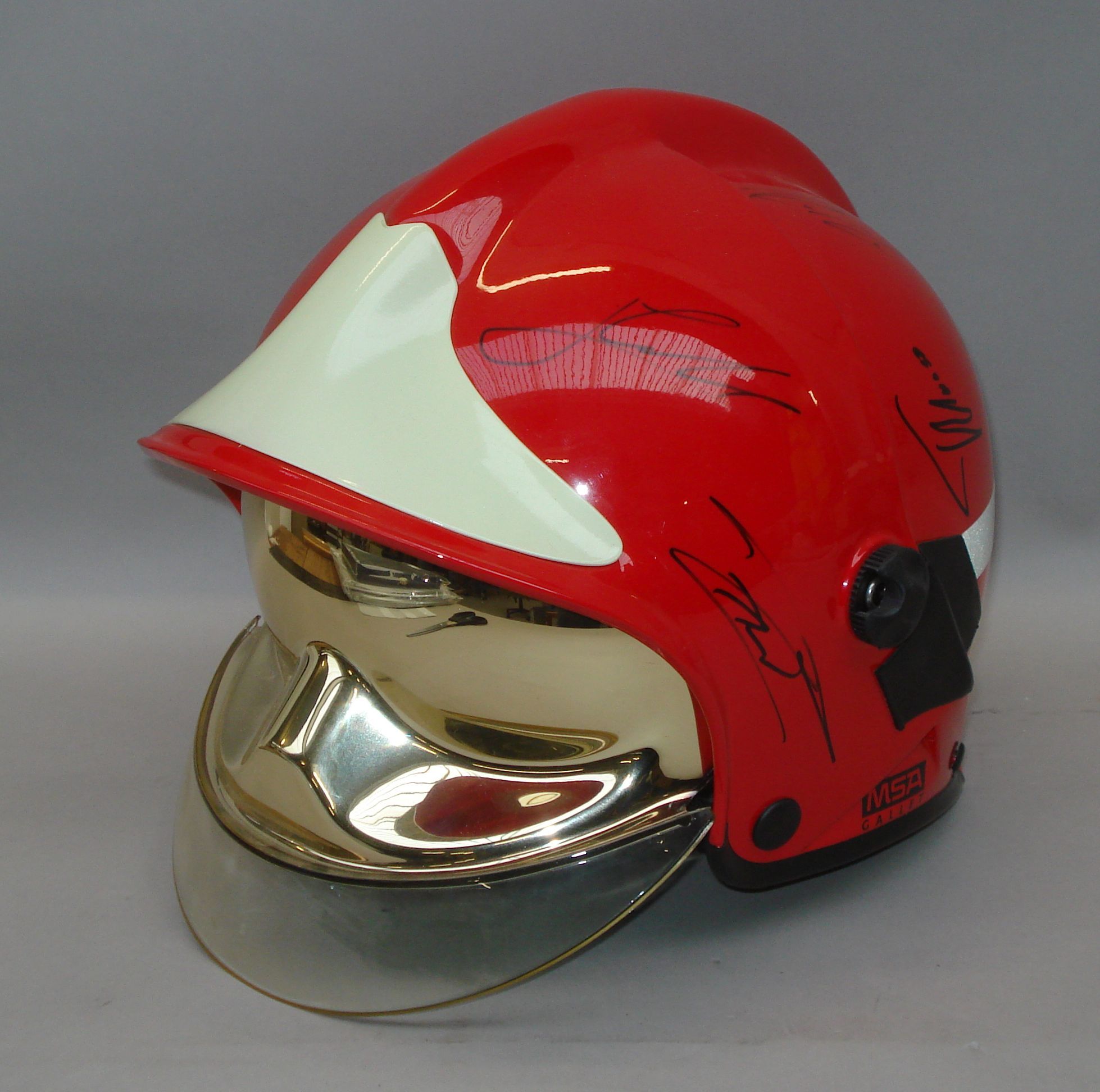 Bonhams Cars : A French firefighter's helmet signed by 12 Grand Prix ...