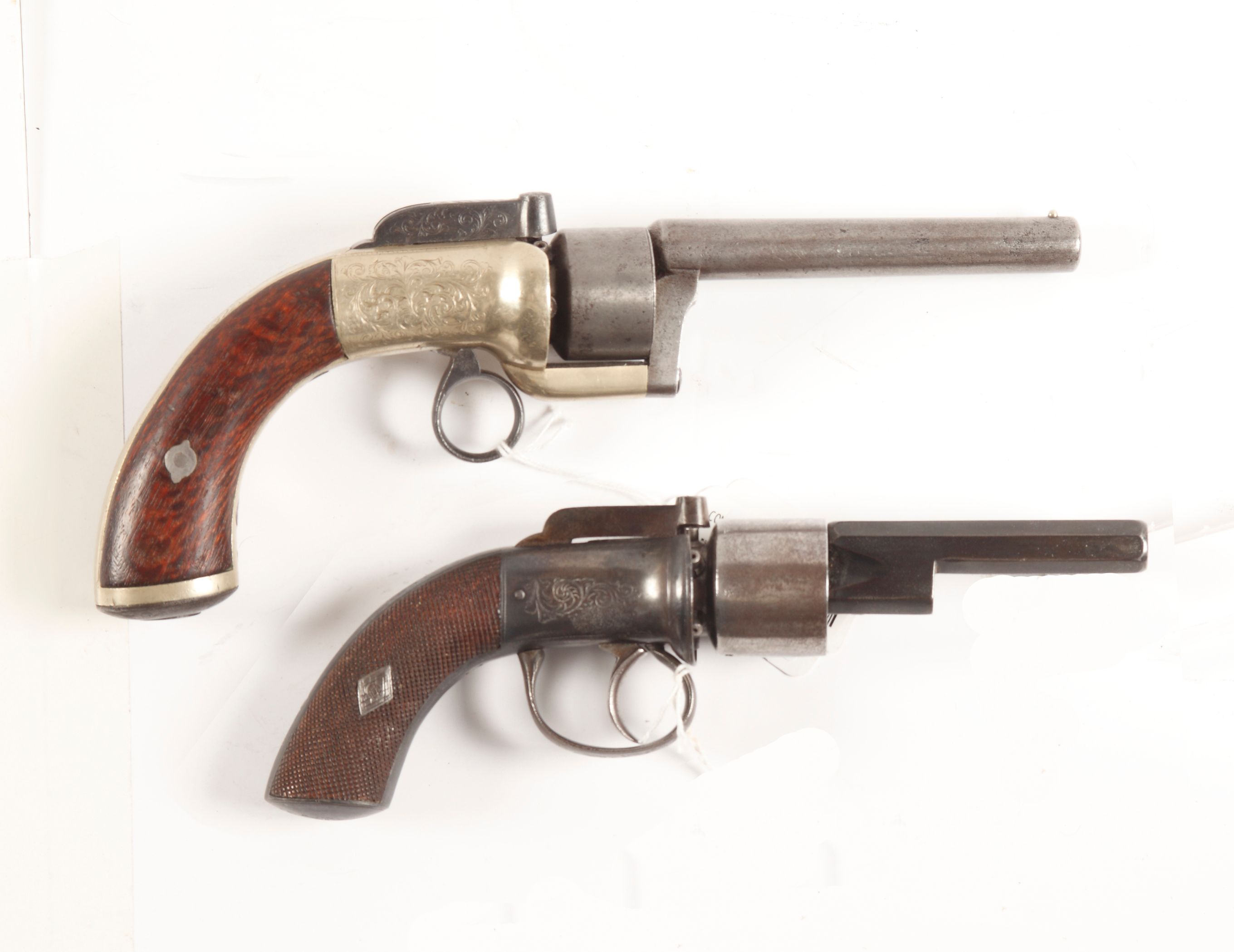 Bonhams : Two Six-Shot Transitional Revolvers