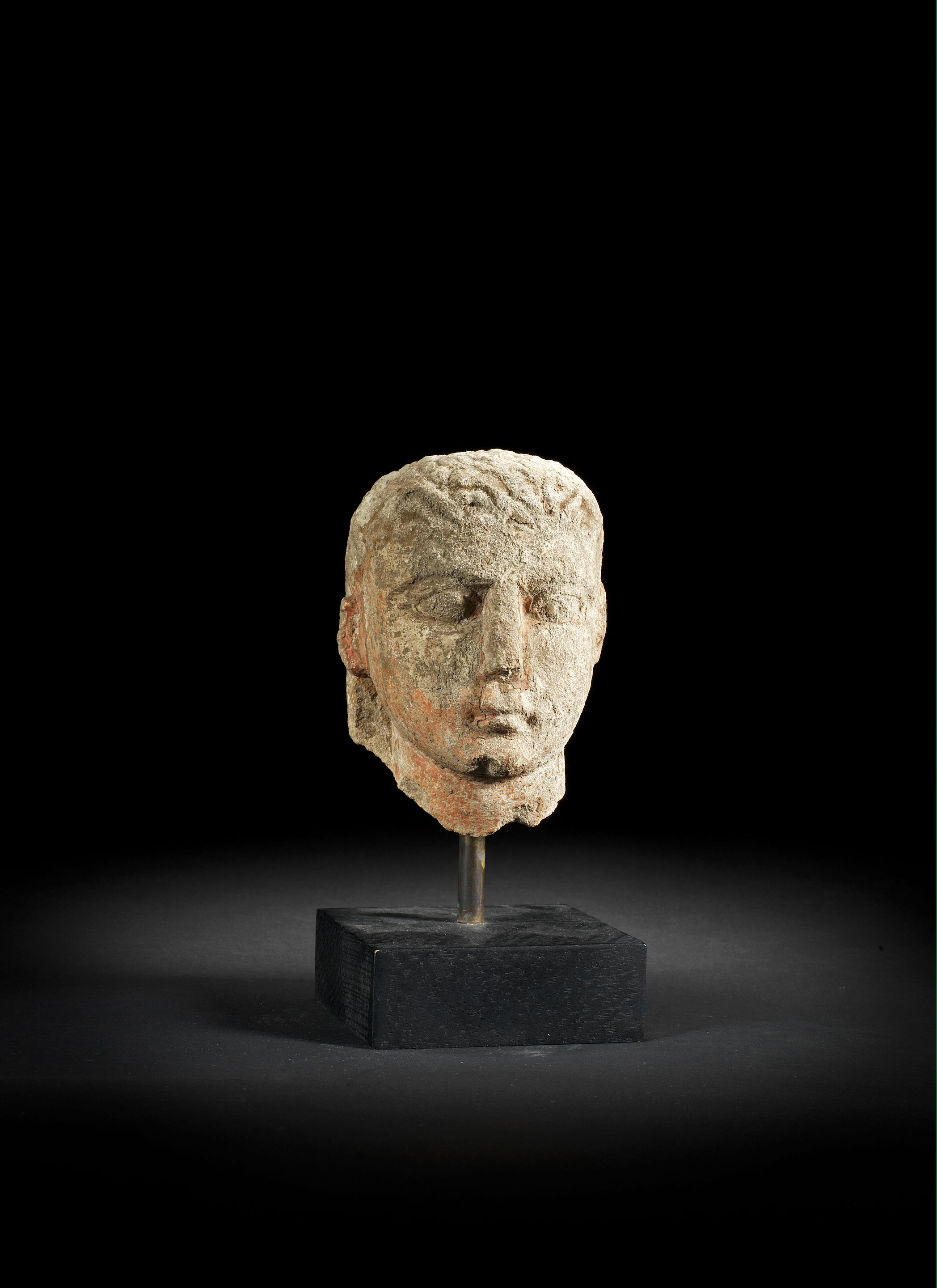 Bonhams : A Greek limestone head of a kouros
