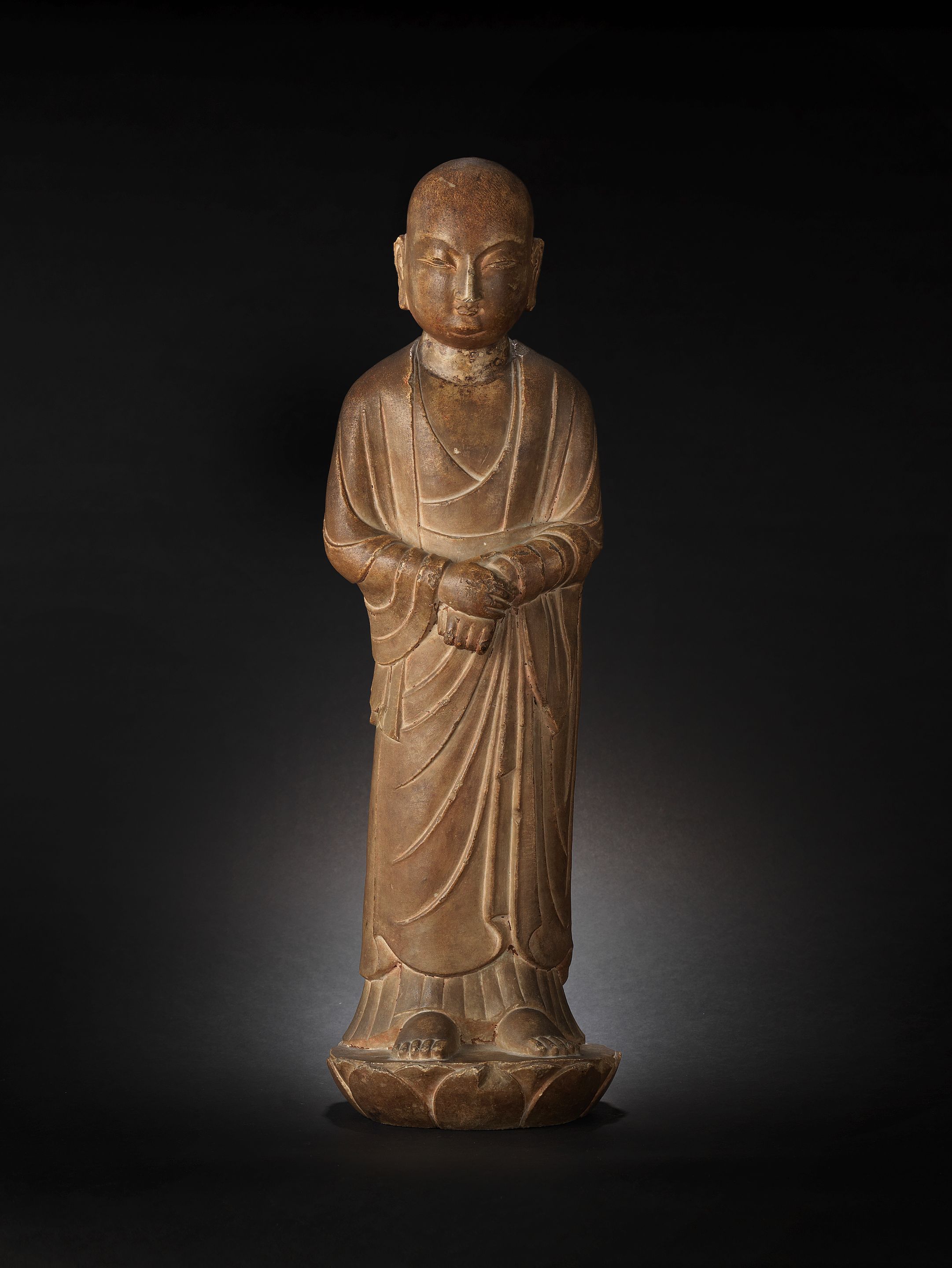 Bonhams : A rare and important marble figure of a Buddhist disciple ...