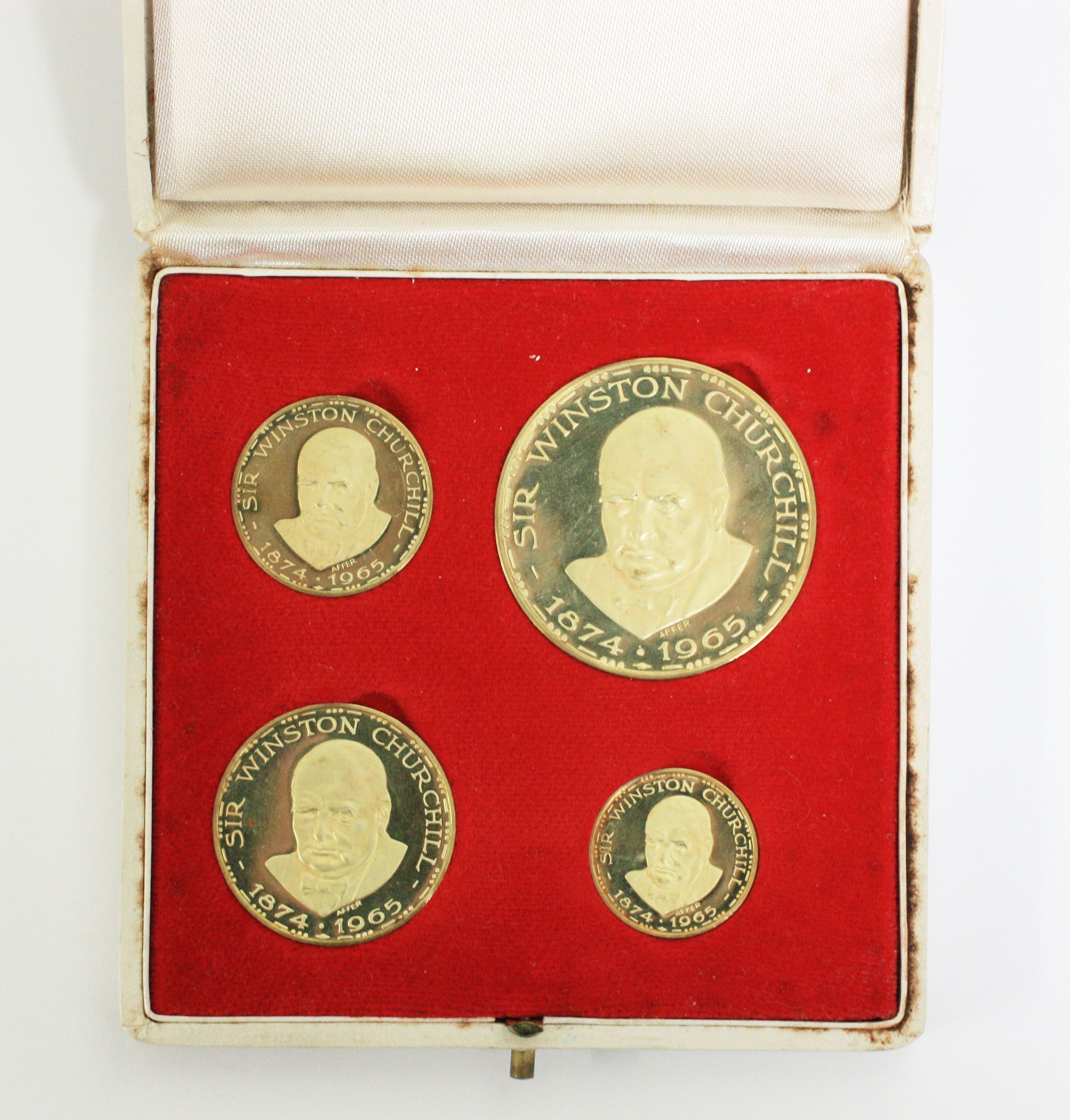 Bonhams : A set of four 18ct gold Winston Churchill commemorative ...