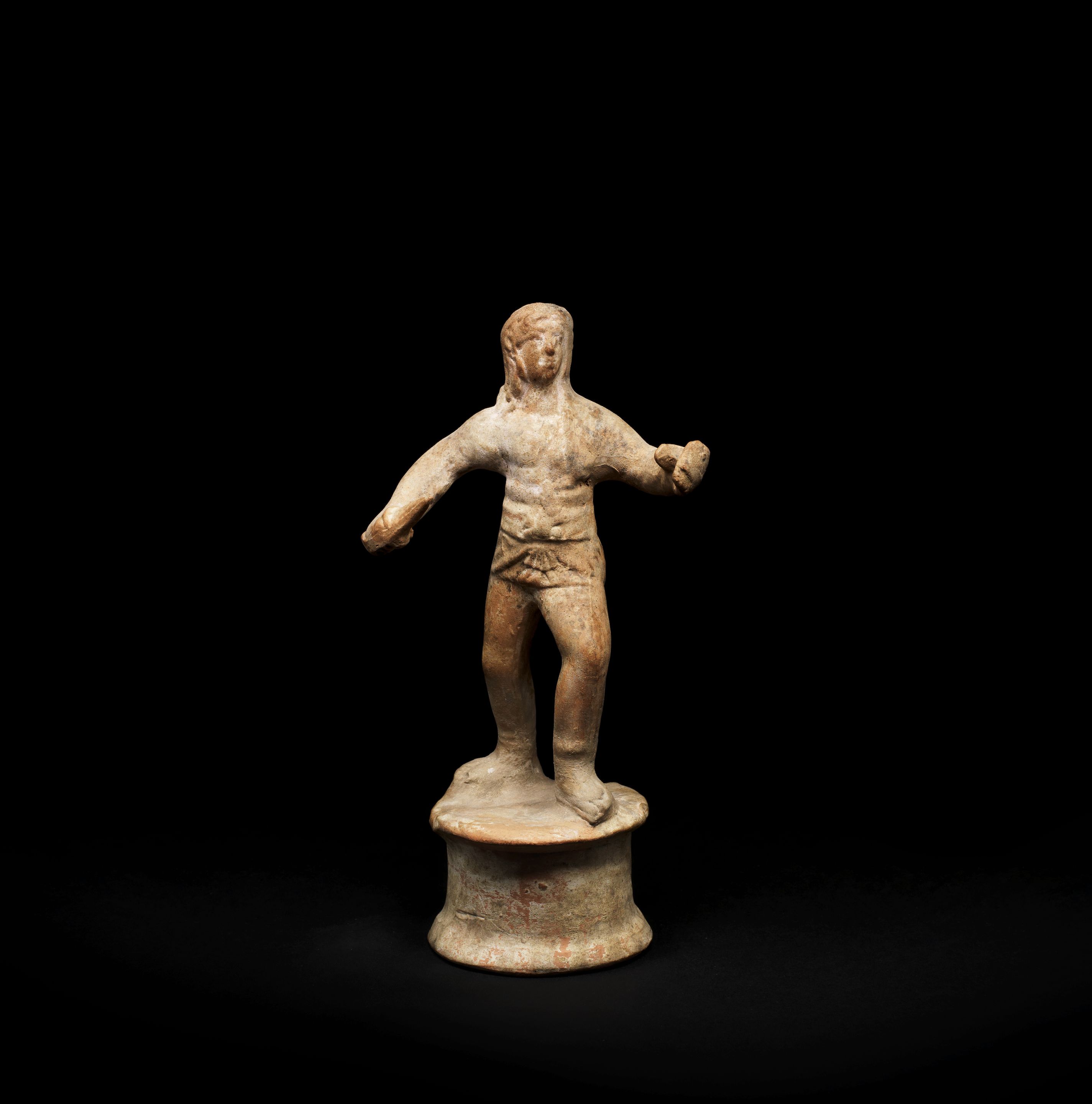 Bonhams : A Roman terracotta figure of a gladiator