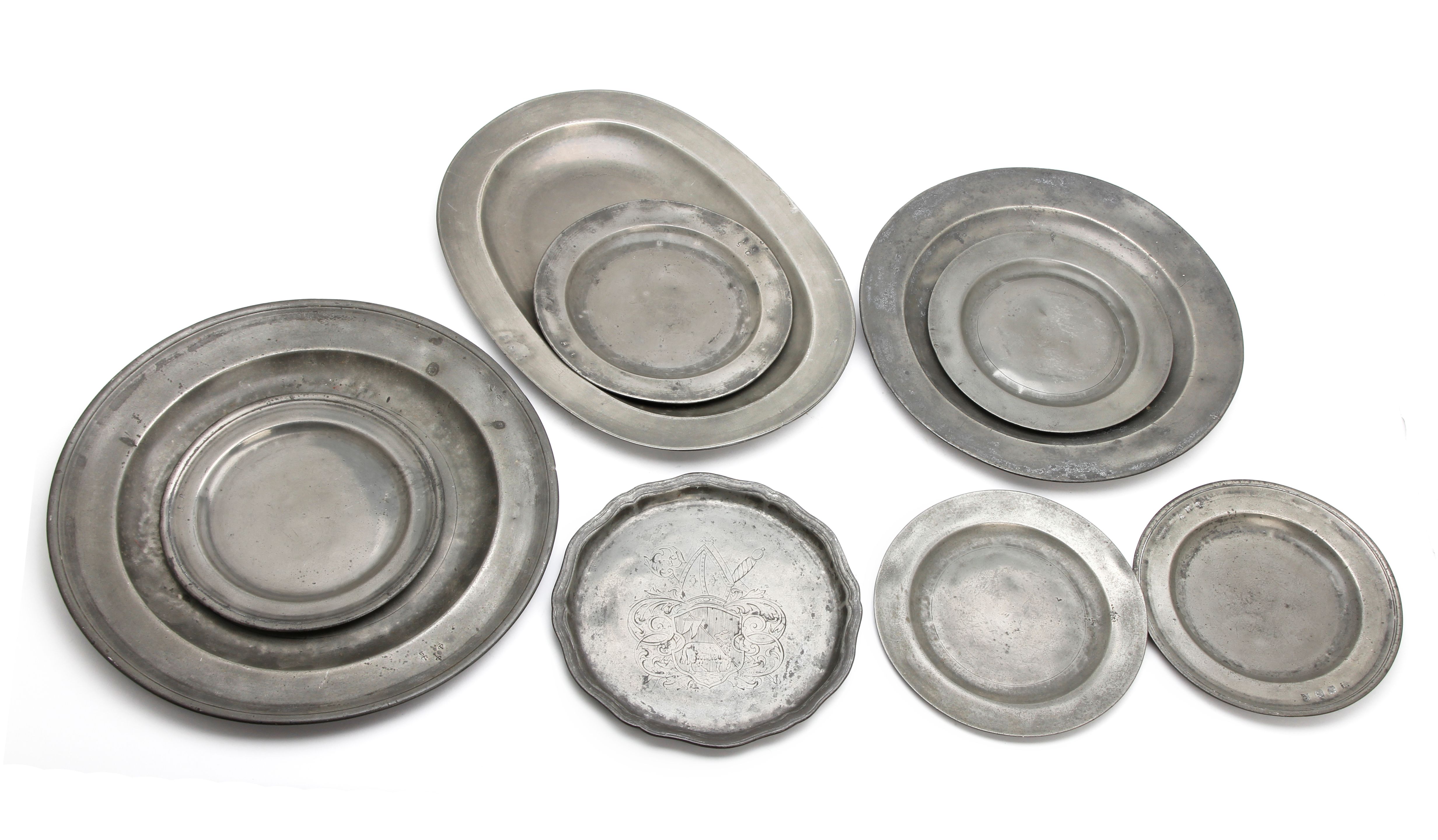 Bonhams : A miscellaneous collection of pewter plates, mostly 18th century