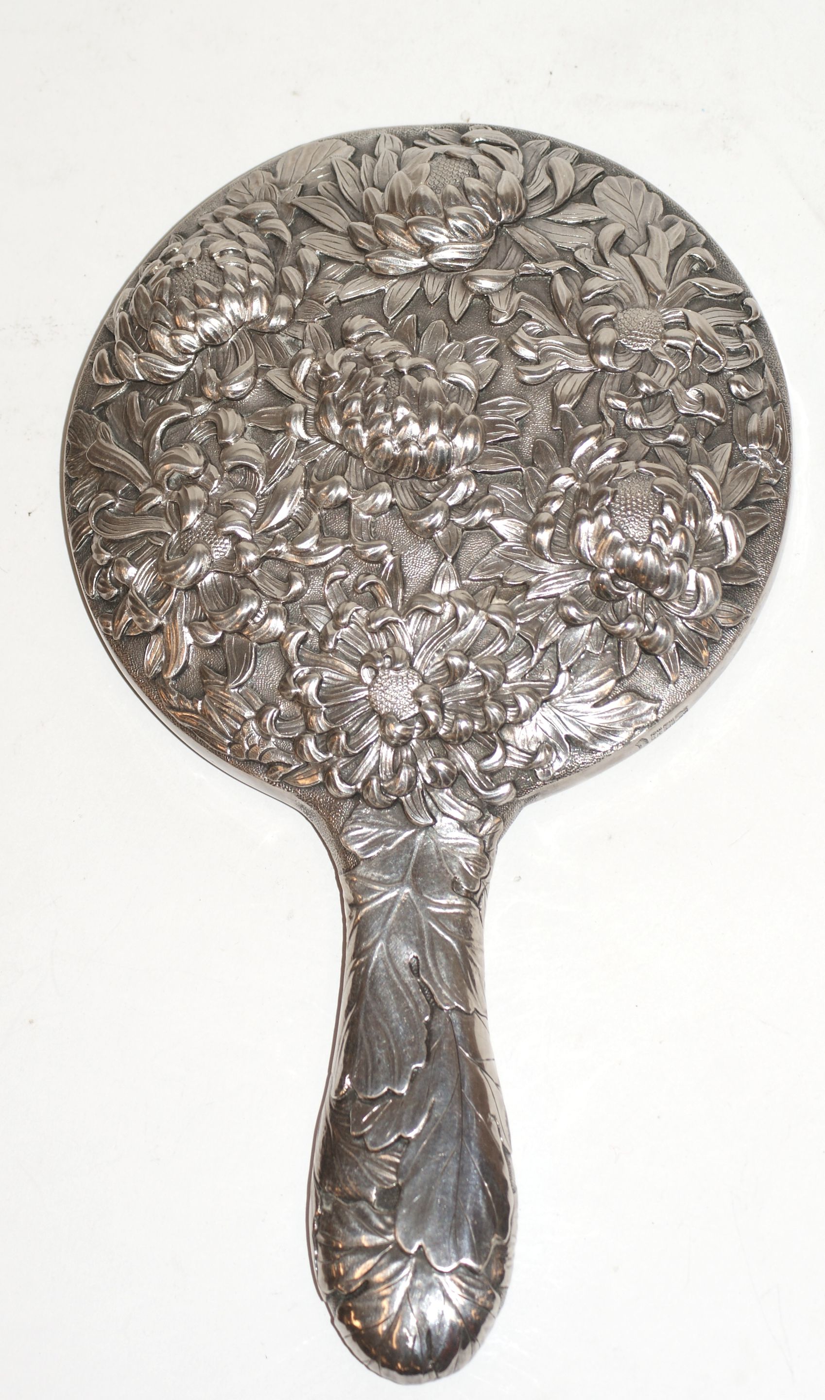 Bonhams : A Japanese silver hand mirror, by Watanabe Zo, circa 1900
