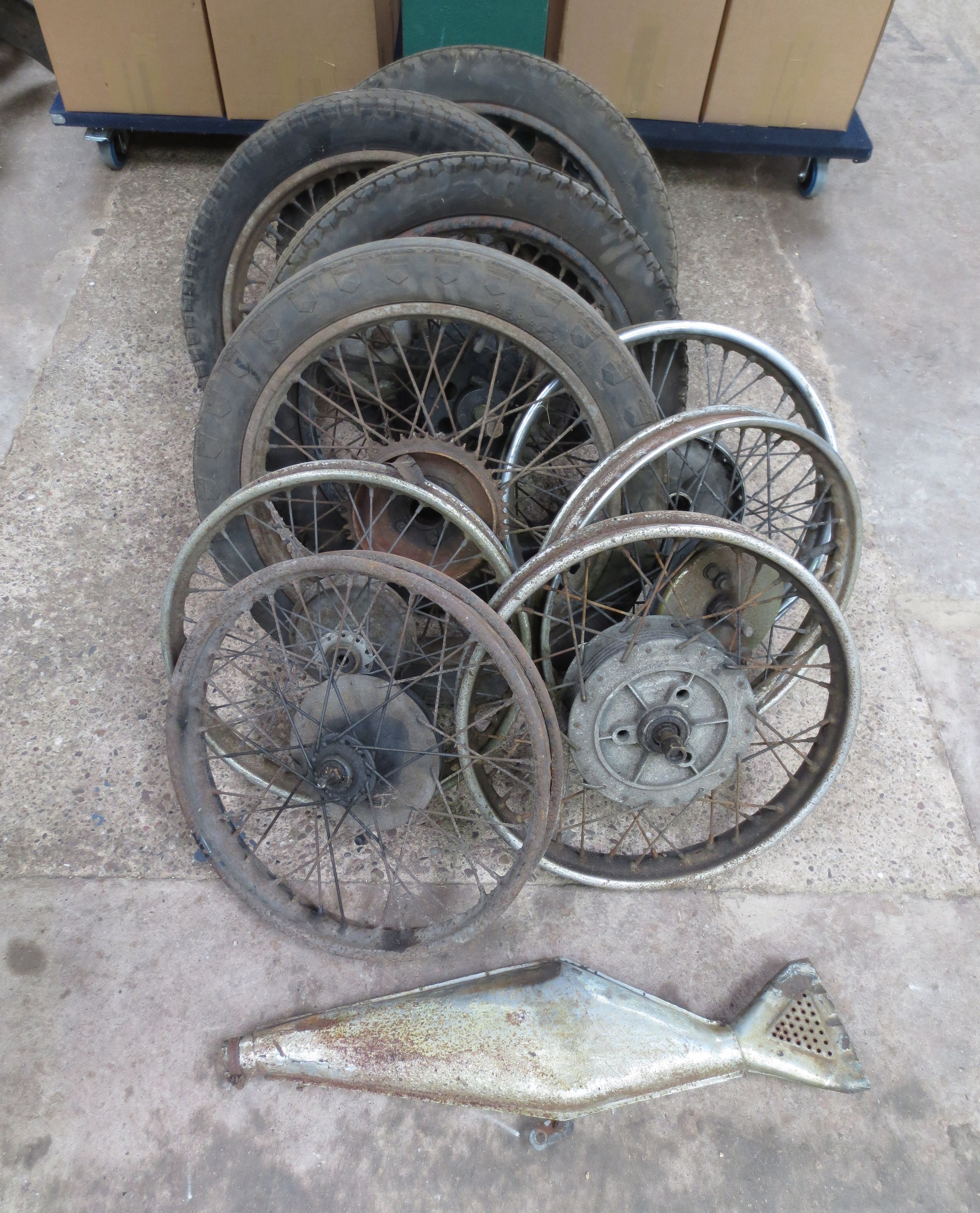 Bonhams Cars : Assorted wheels and a Velocette fishtail silencer,