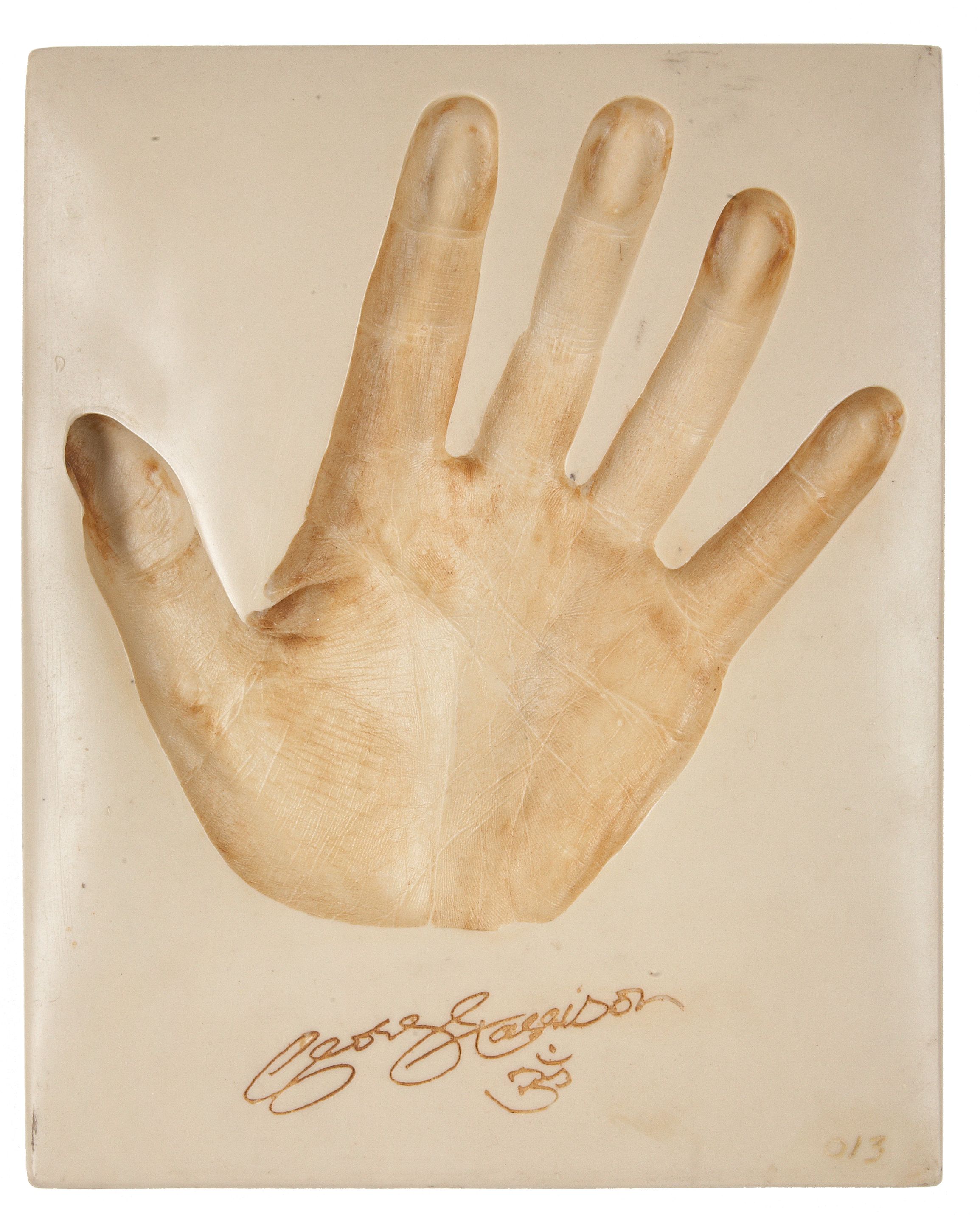 Bonhams : George Harrison A hand imprint plaque,