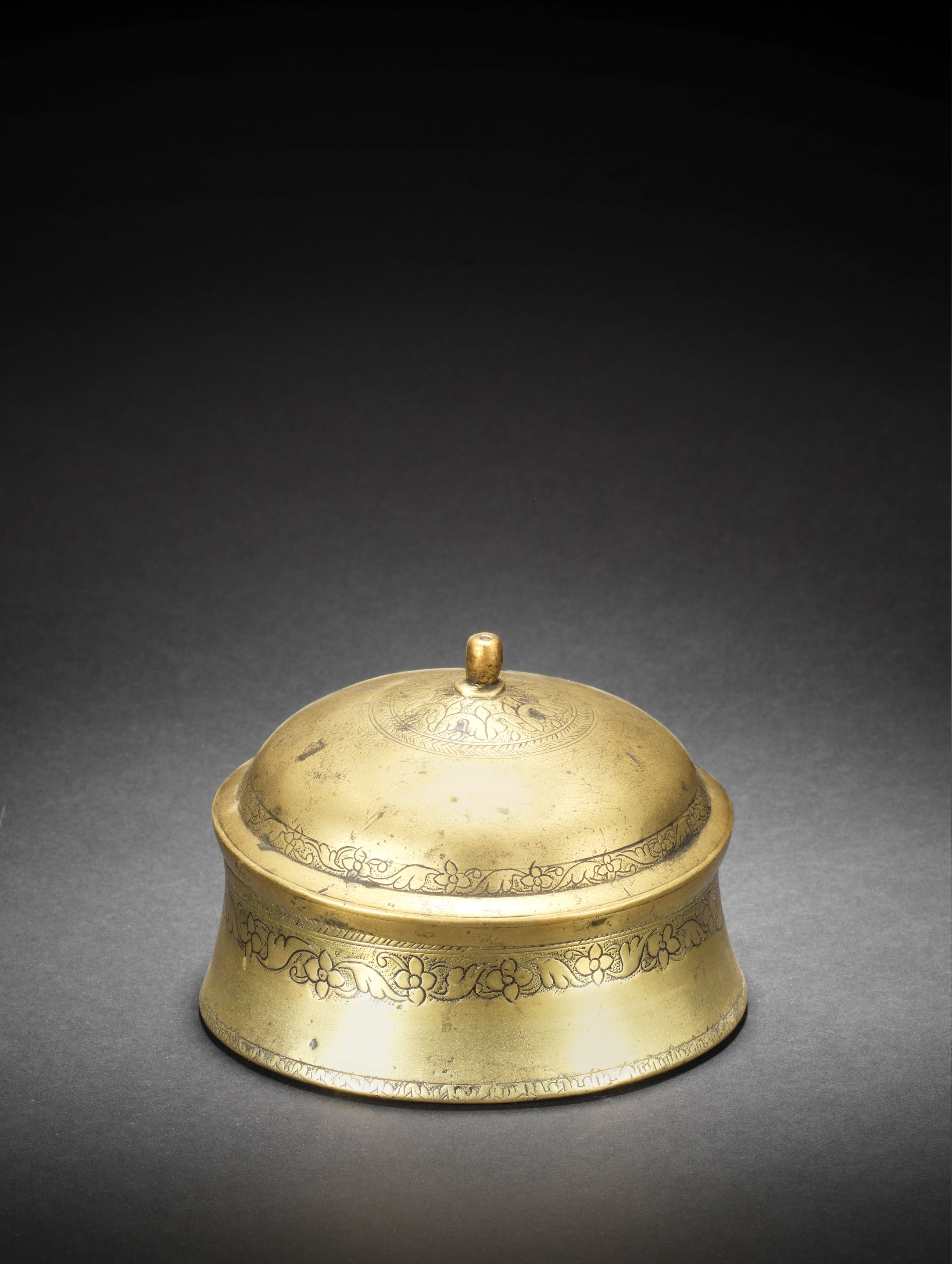 Bonhams : An engraved brass lidded pandan Box India, 17th Century
