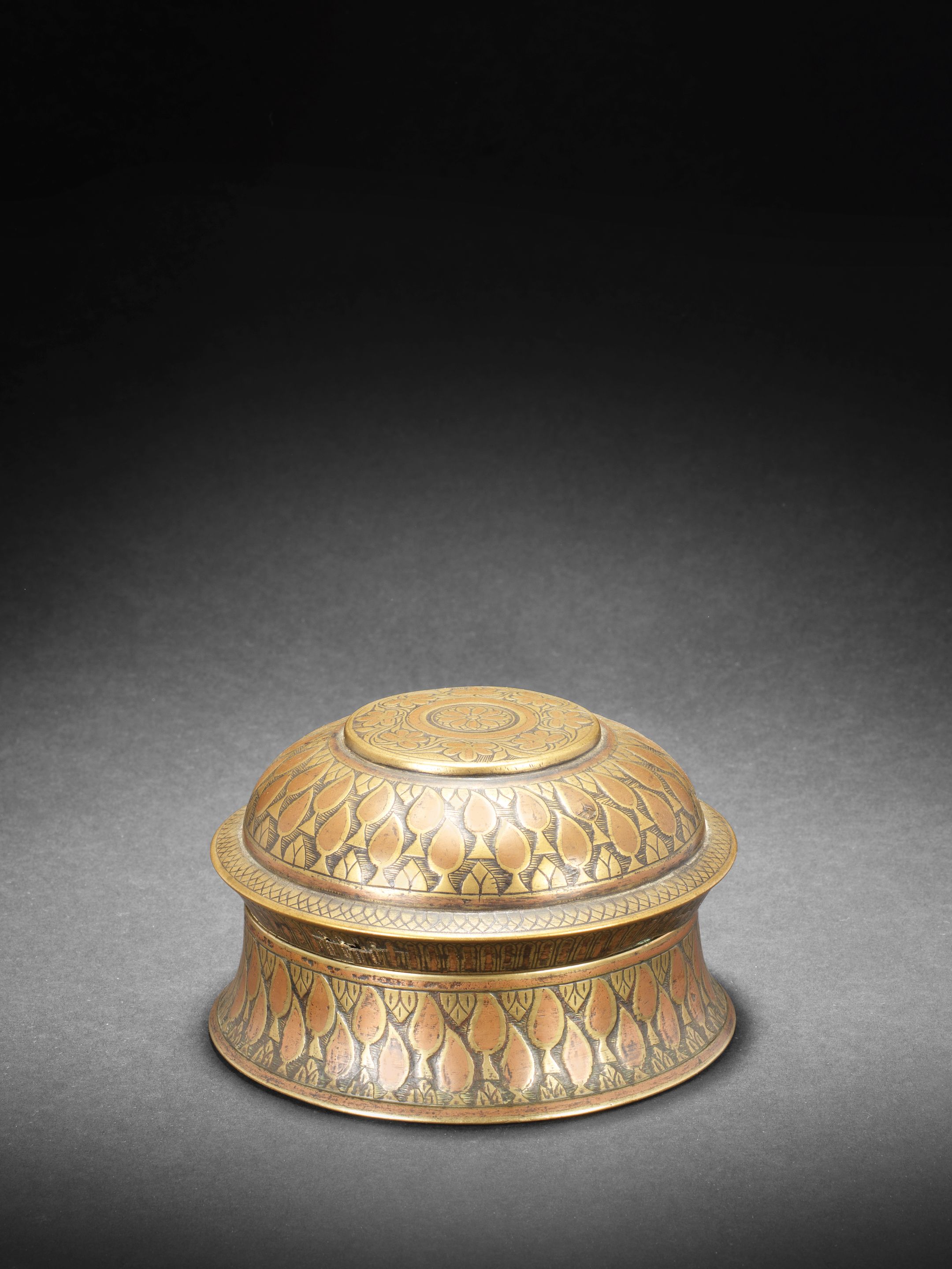 Bonhams : A copper-inlaid brass lidded pandan Box North India, 17th Century