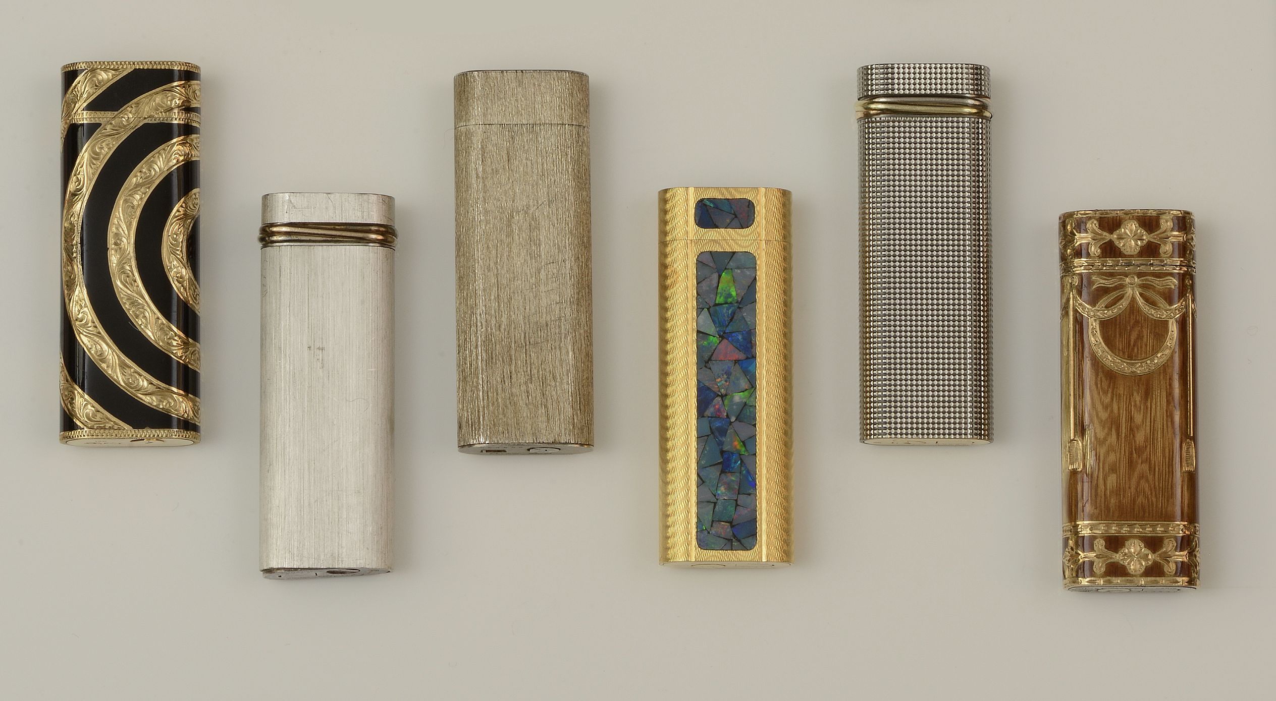 Bonhams : A collection of six cigarette lighters