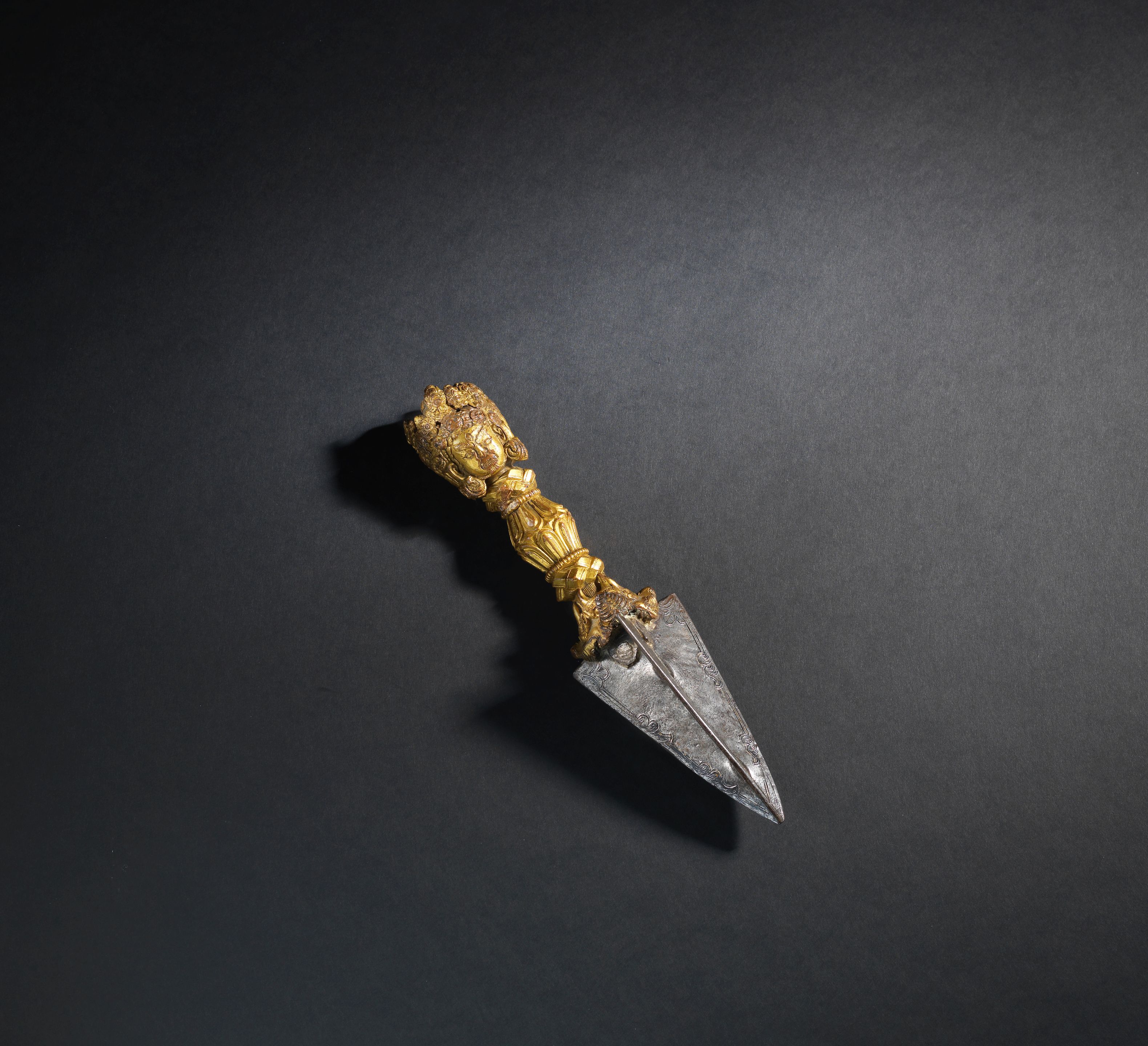 Bonhams : A gilt-damascened iron phurba Ming dynasty, 15th century