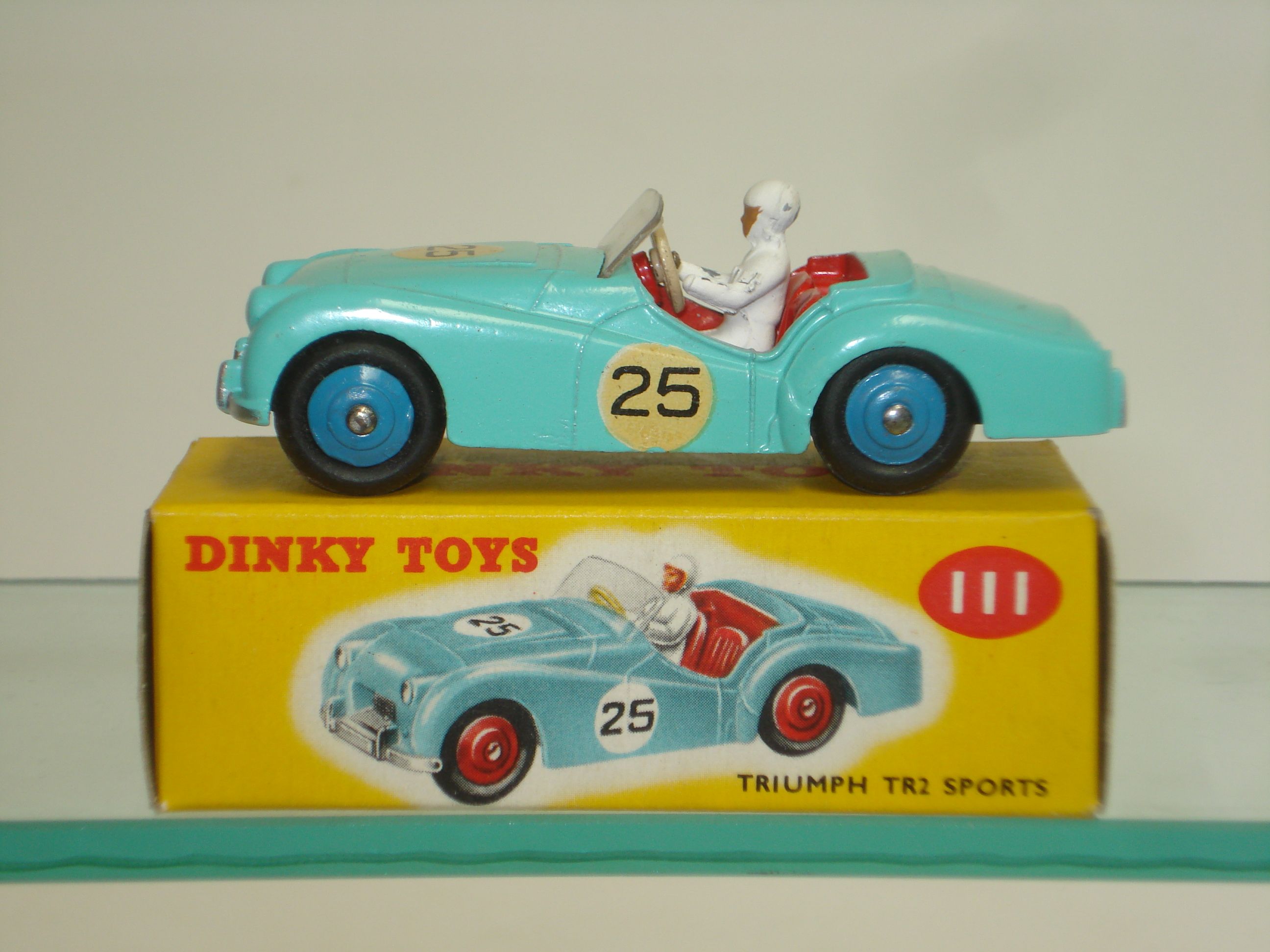 Bonhams : Dinky rare 111 Triumph TR2 Sports car turquoise with blue hubs
