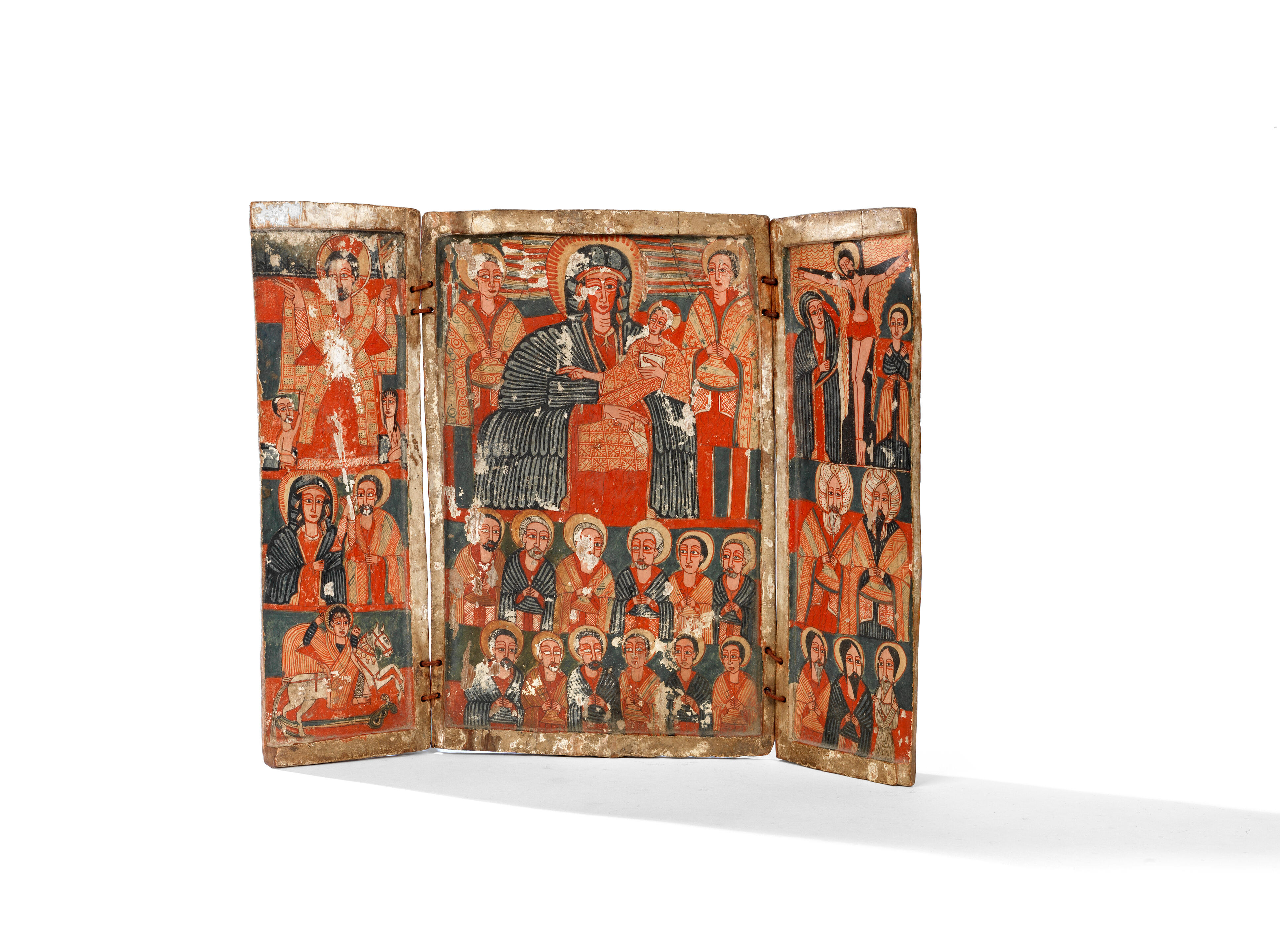 Bonhams : A Coptic painted wood triptych depicting The Life of Christpossibly 17th / 18th century