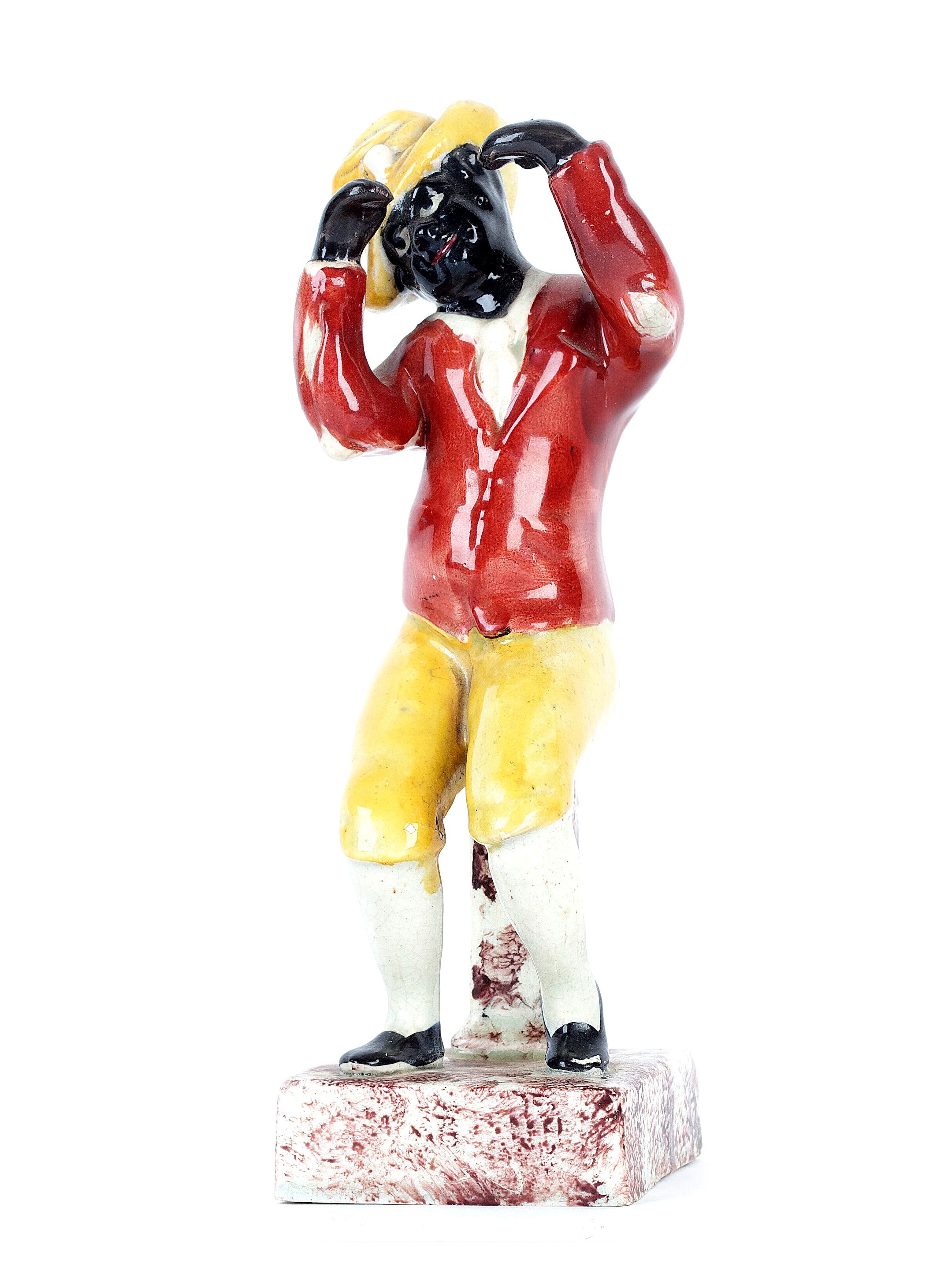 Bonhams : A Staffordshire pearlware figure of Thomas Rice as 'Jim Crow', circa 1828-30