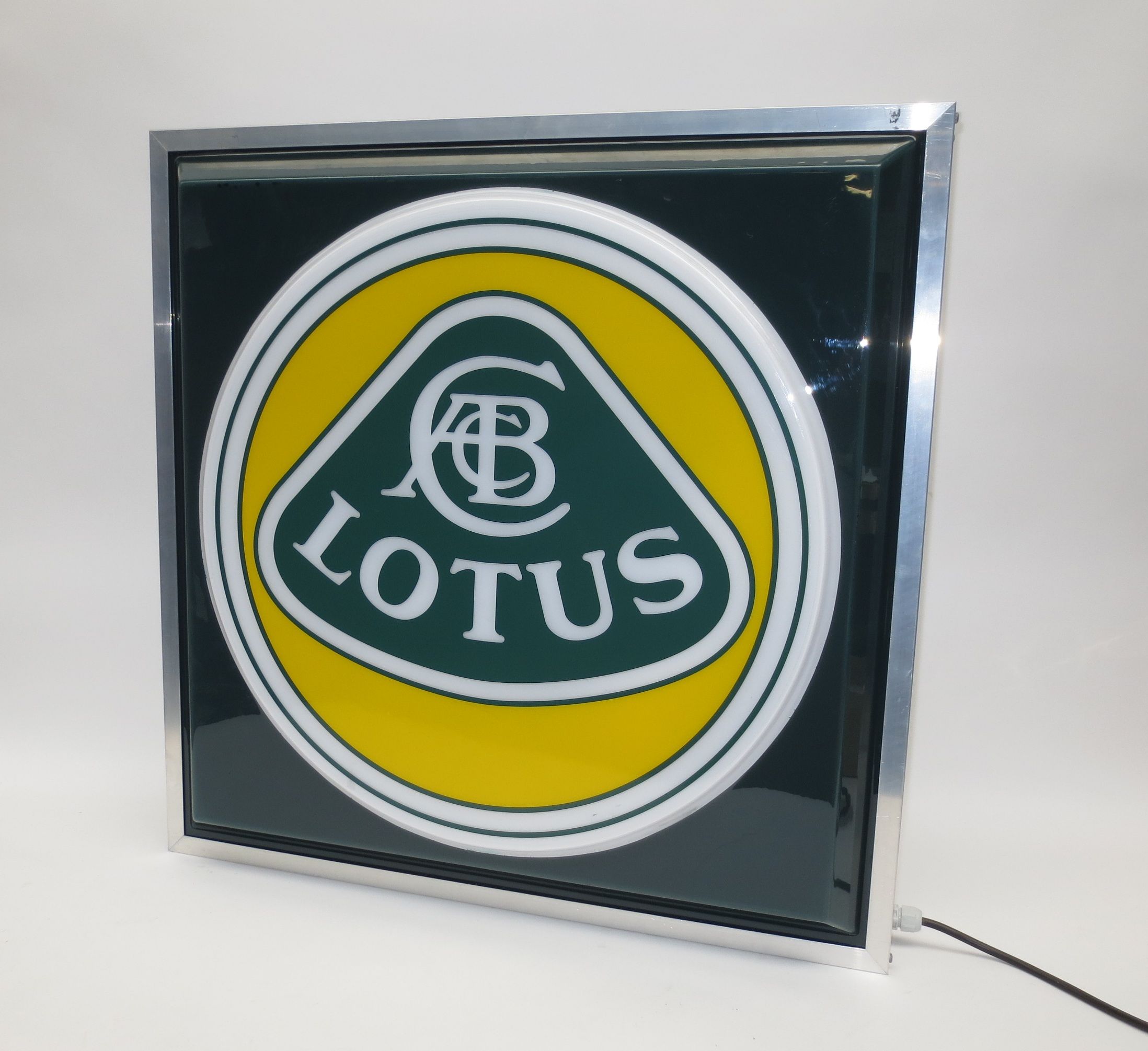 Bonhams Cars : A 'Lotus' illuminating sign,