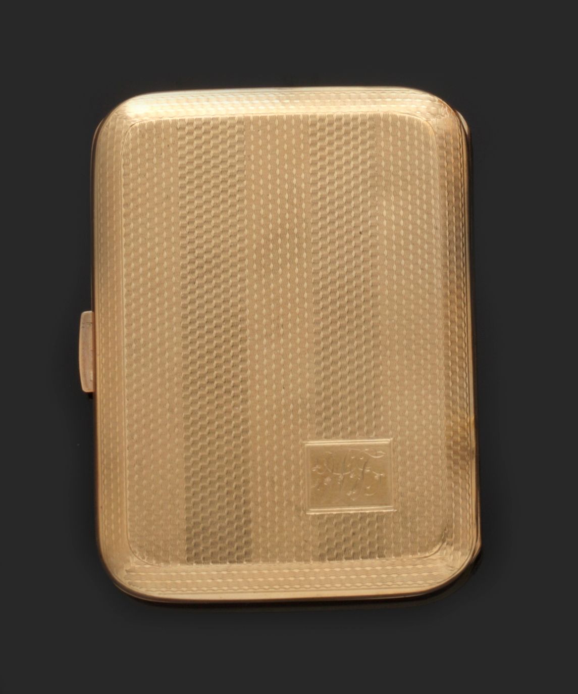 Bonhams : A 9ct gold cigarette case