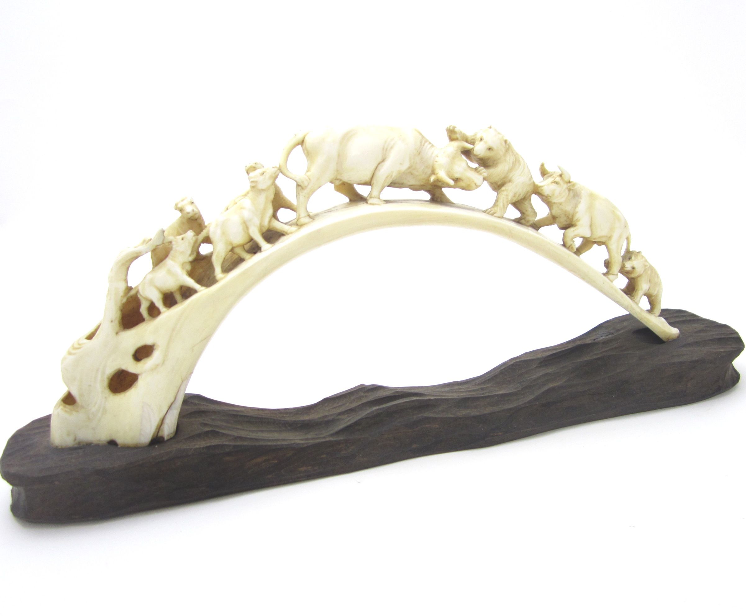 Bonhams : A boar's tusk bridge group 19th century