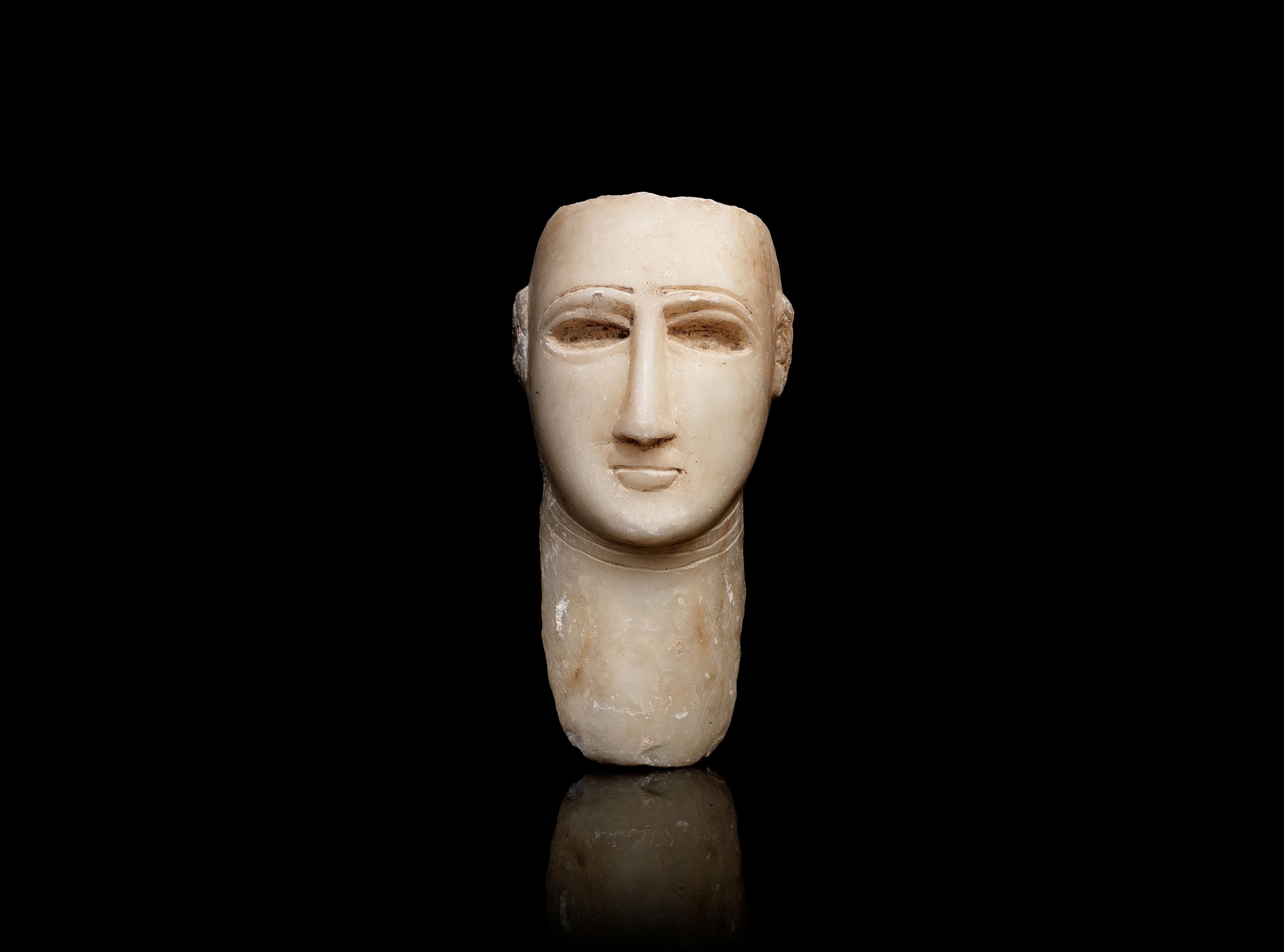 Bonhams : A South Arabian alabaster head